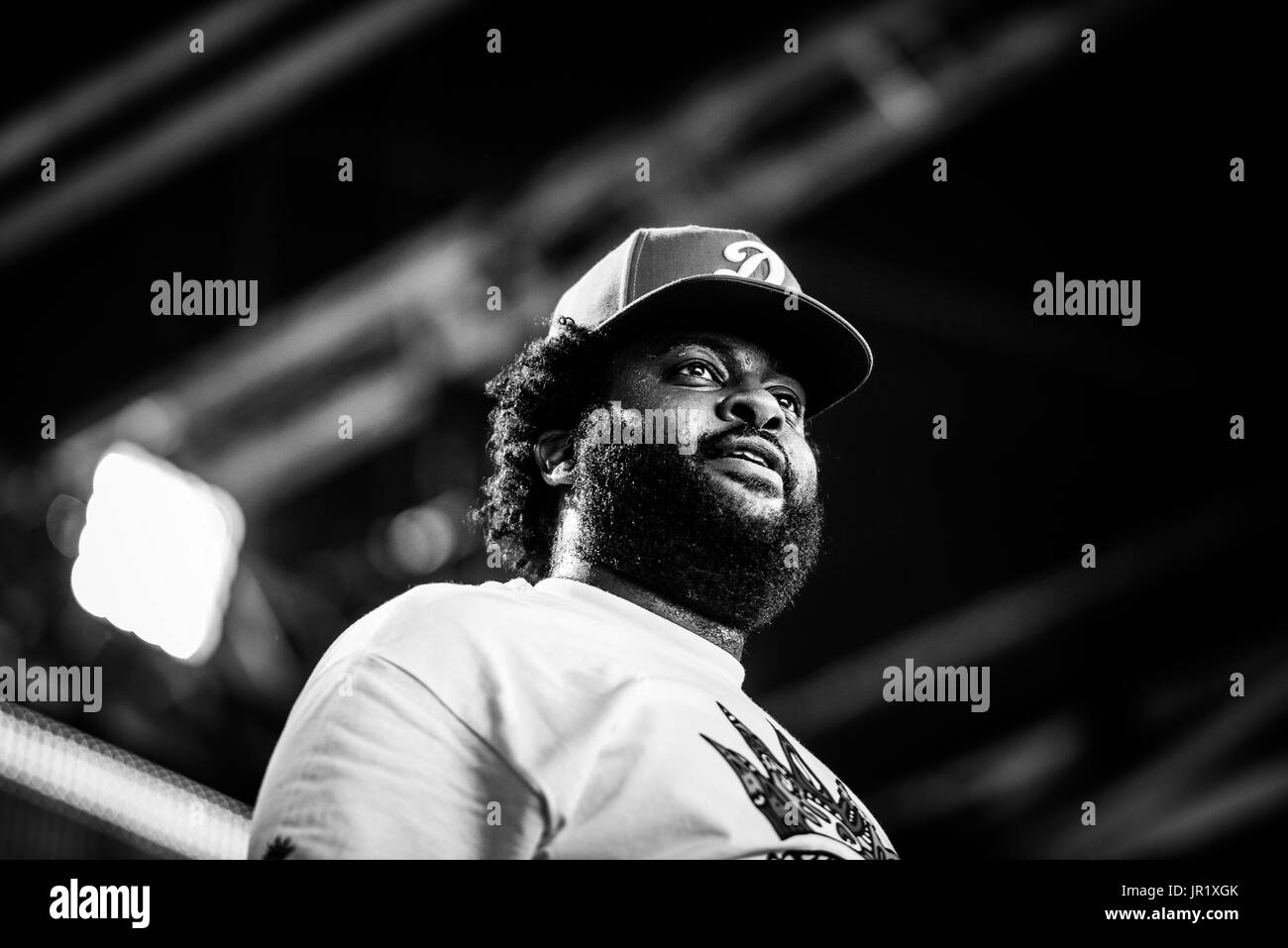 Rapper holding a microphone Black and White Stock Photos & Images - Alamy