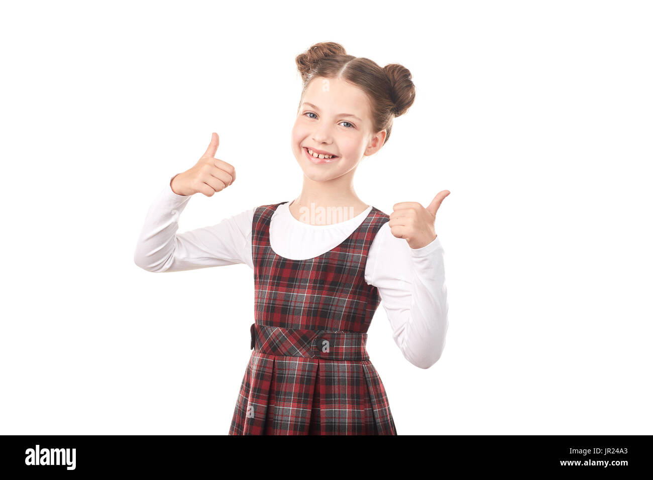 School girl giving thumbs up Stock Photo - Alamy