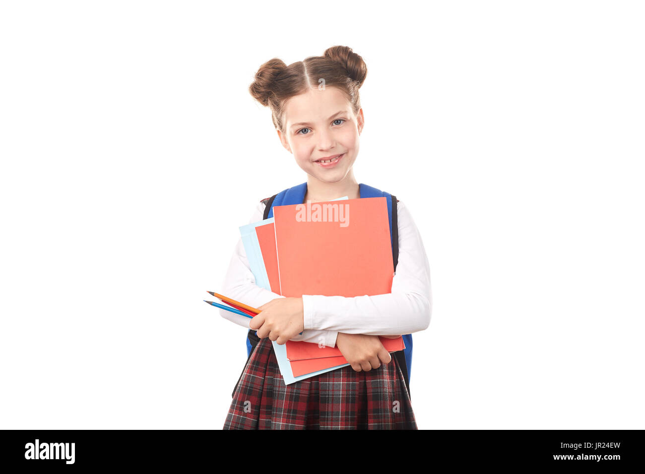 School girl holding textbooks Stock Photo - Alamy