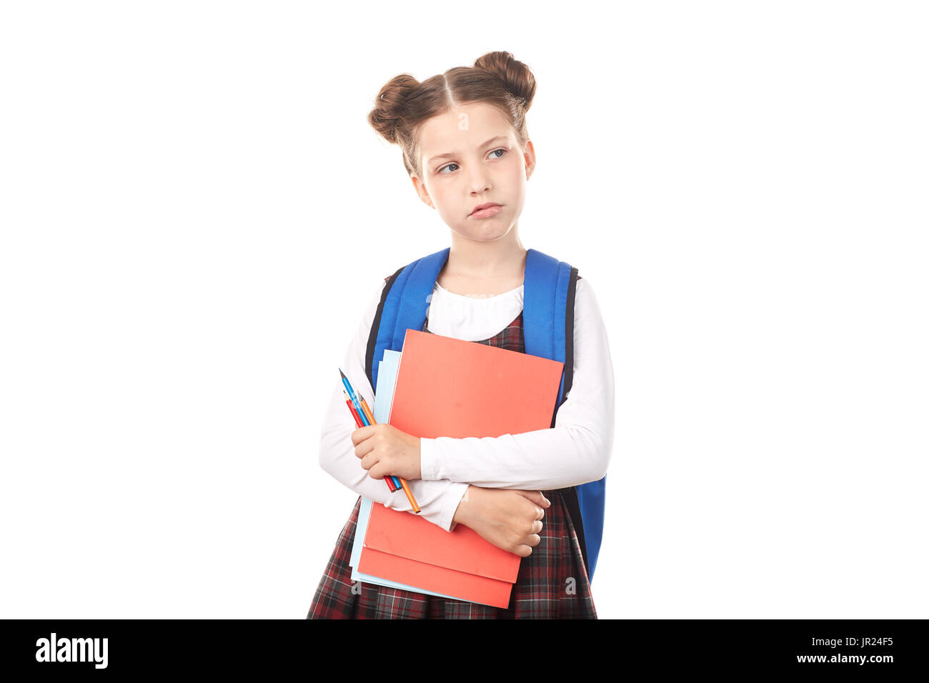Elementary student thinking sadly Stock Photo - Alamy