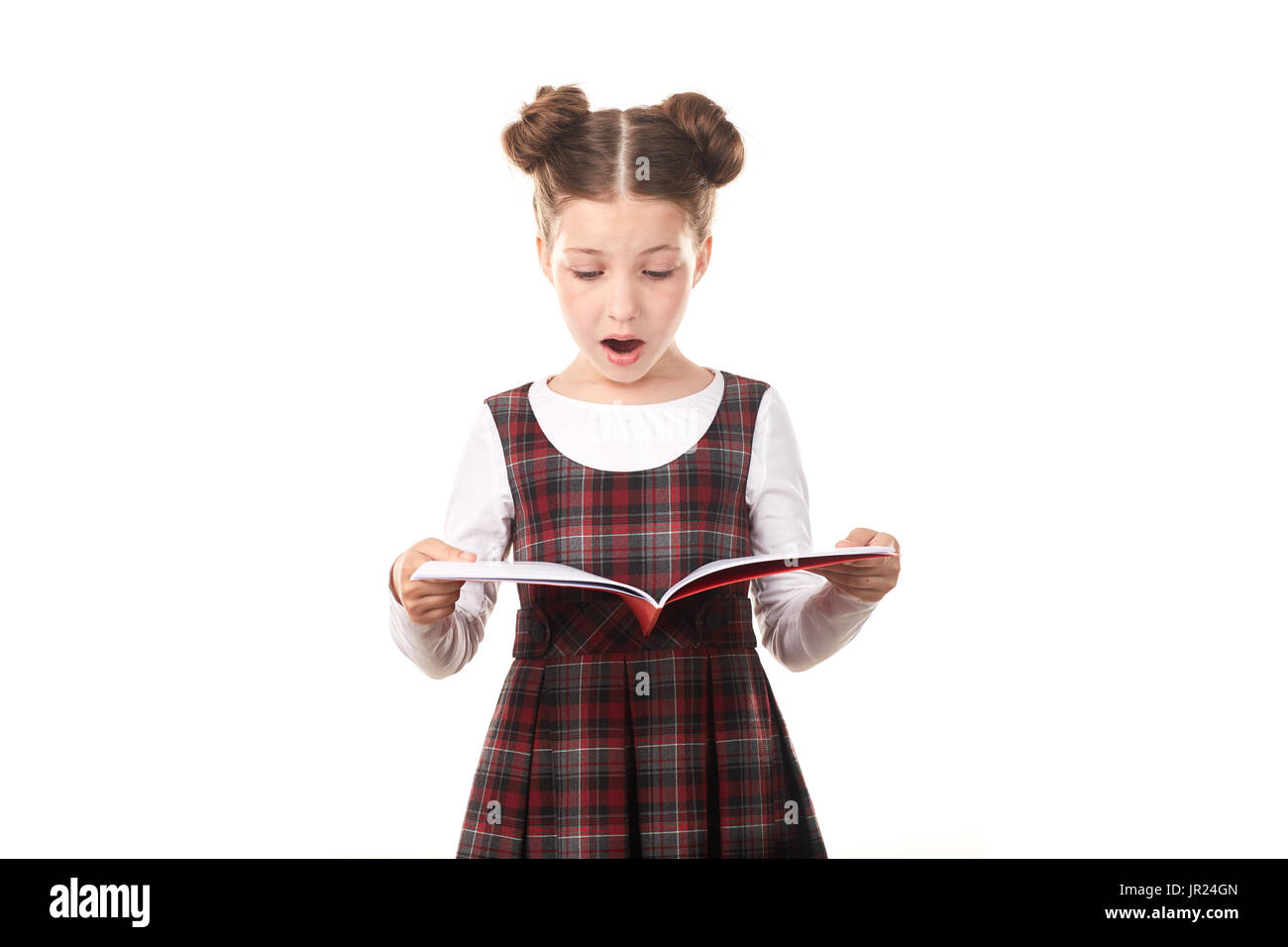 Shocked child reading hi-res stock photography and images - Alamy