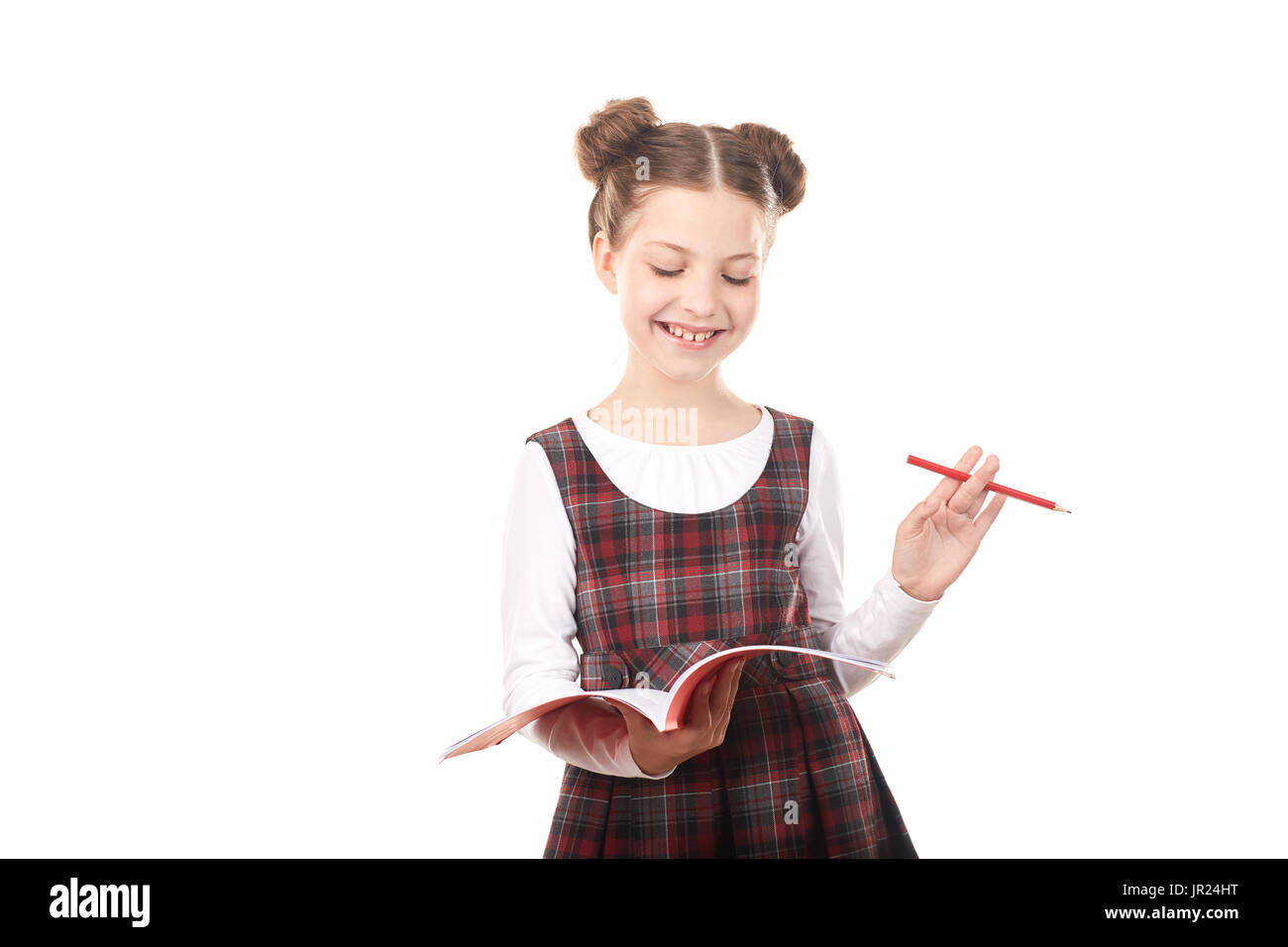 Elementary student enjoying reading Stock Photo - Alamy