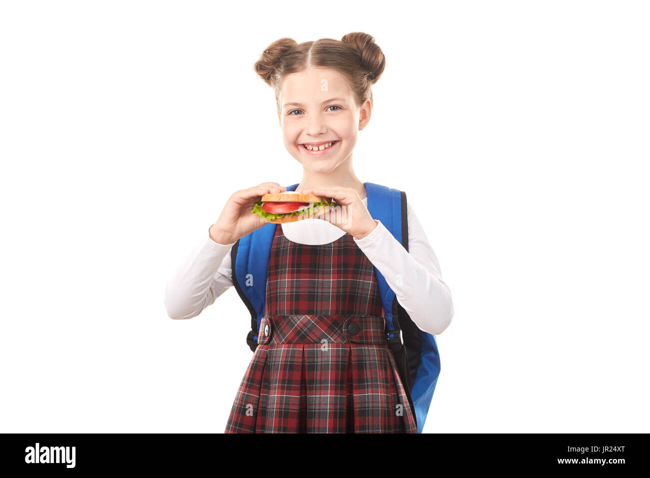 School girl eating sandwich Stock Photo - Alamy