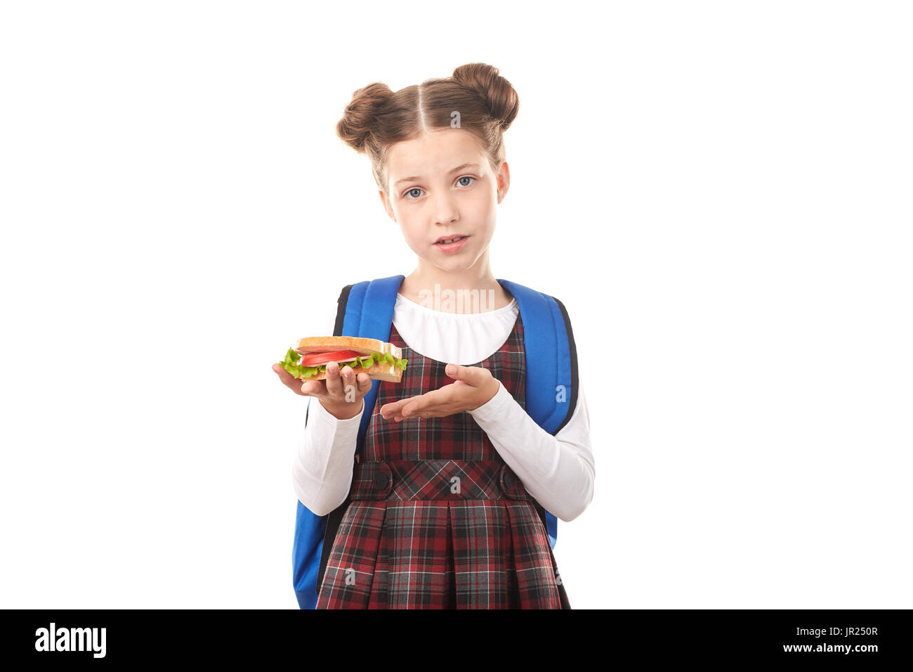 School girl eating sandwich Stock Photo - Alamy