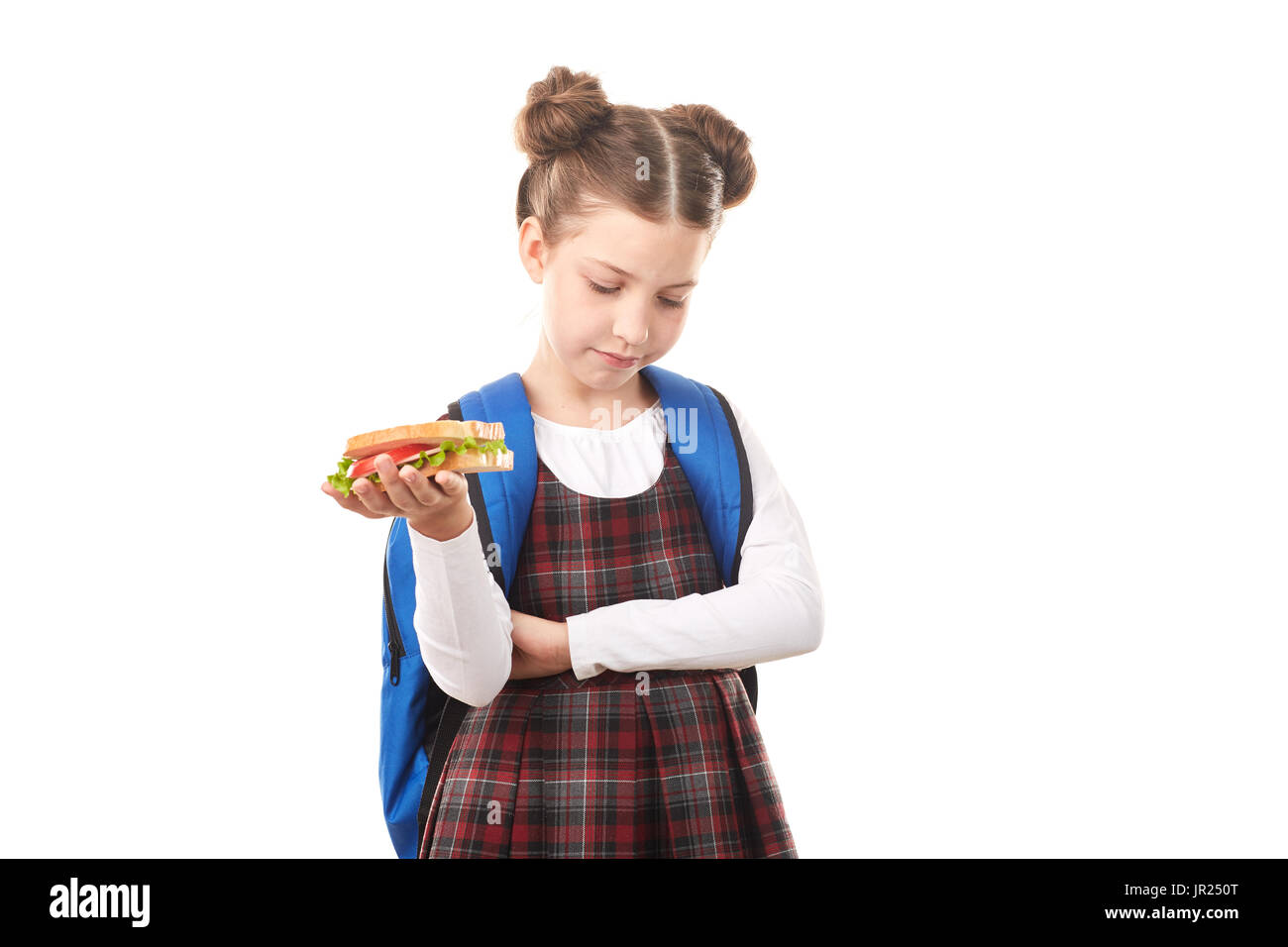 School girl eating sandwich Stock Photo - Alamy