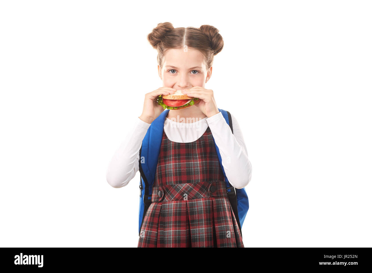 School girl eating sandwich Stock Photo - Alamy
