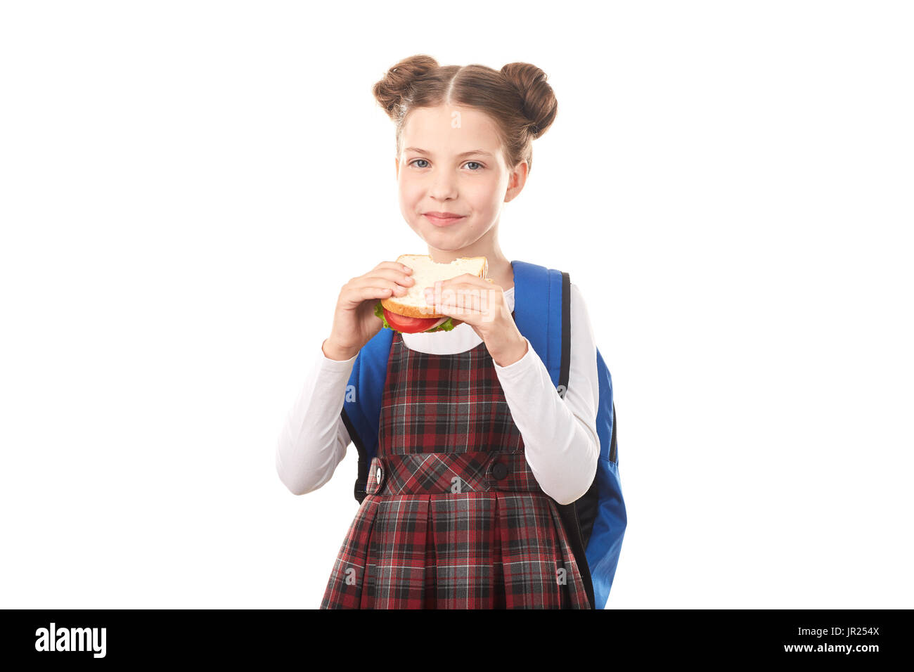 School girl eating sandwich Stock Photo - Alamy