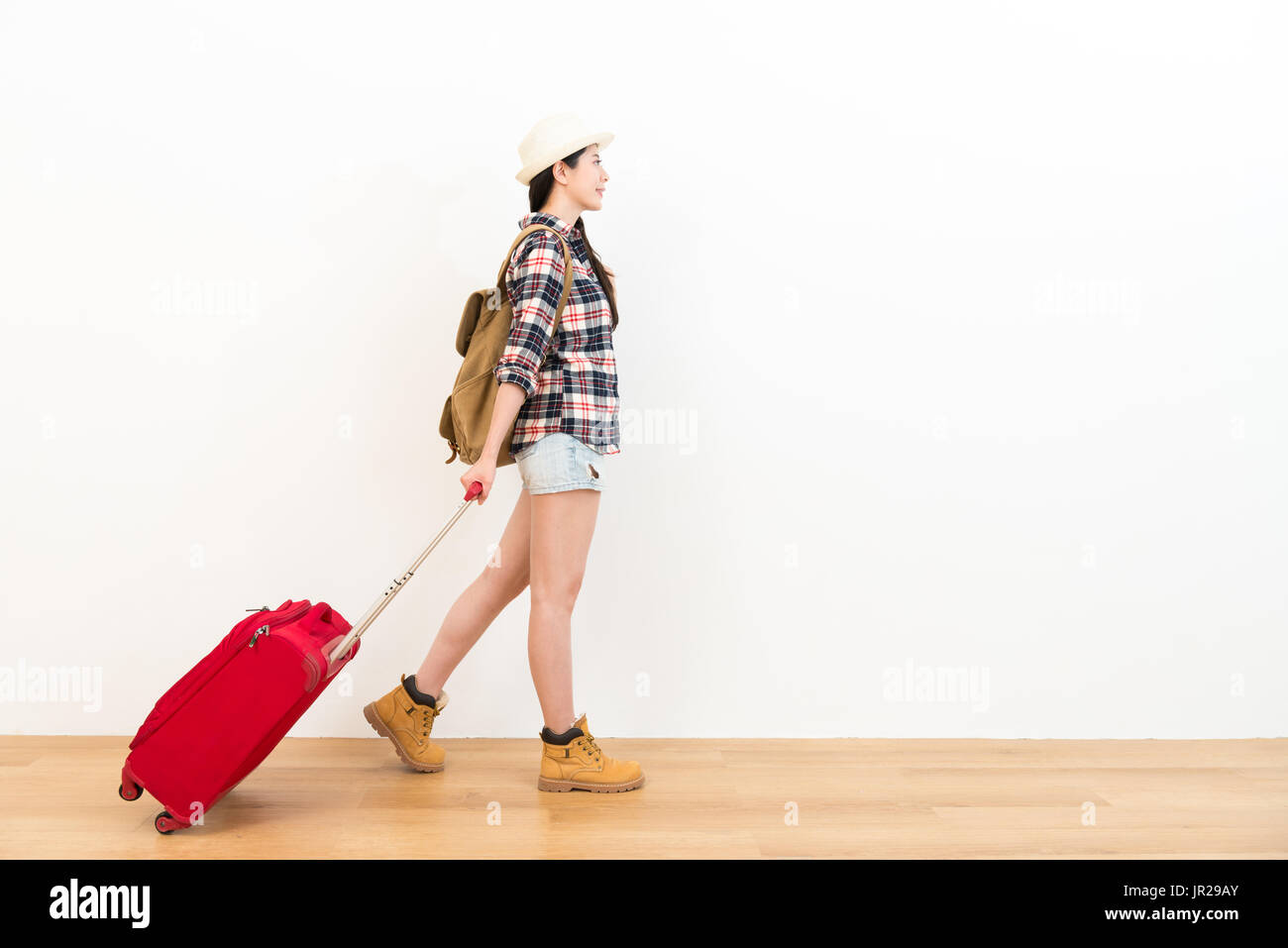 happy sweet backpacker lady planning going to travel and carrying ...