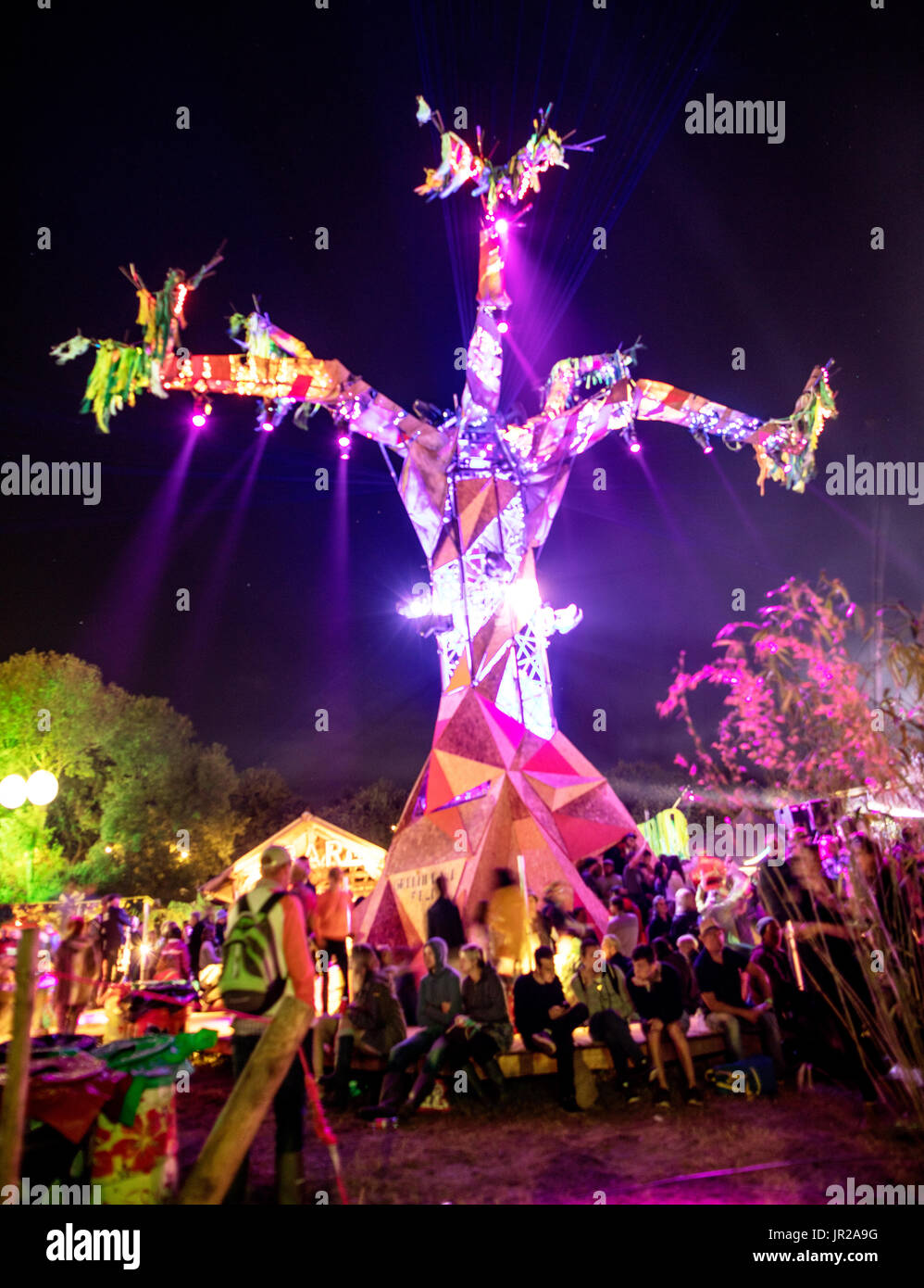 A Giant Magic Tree at Night Glastonbury Festival UK Stock Photo - Alamy