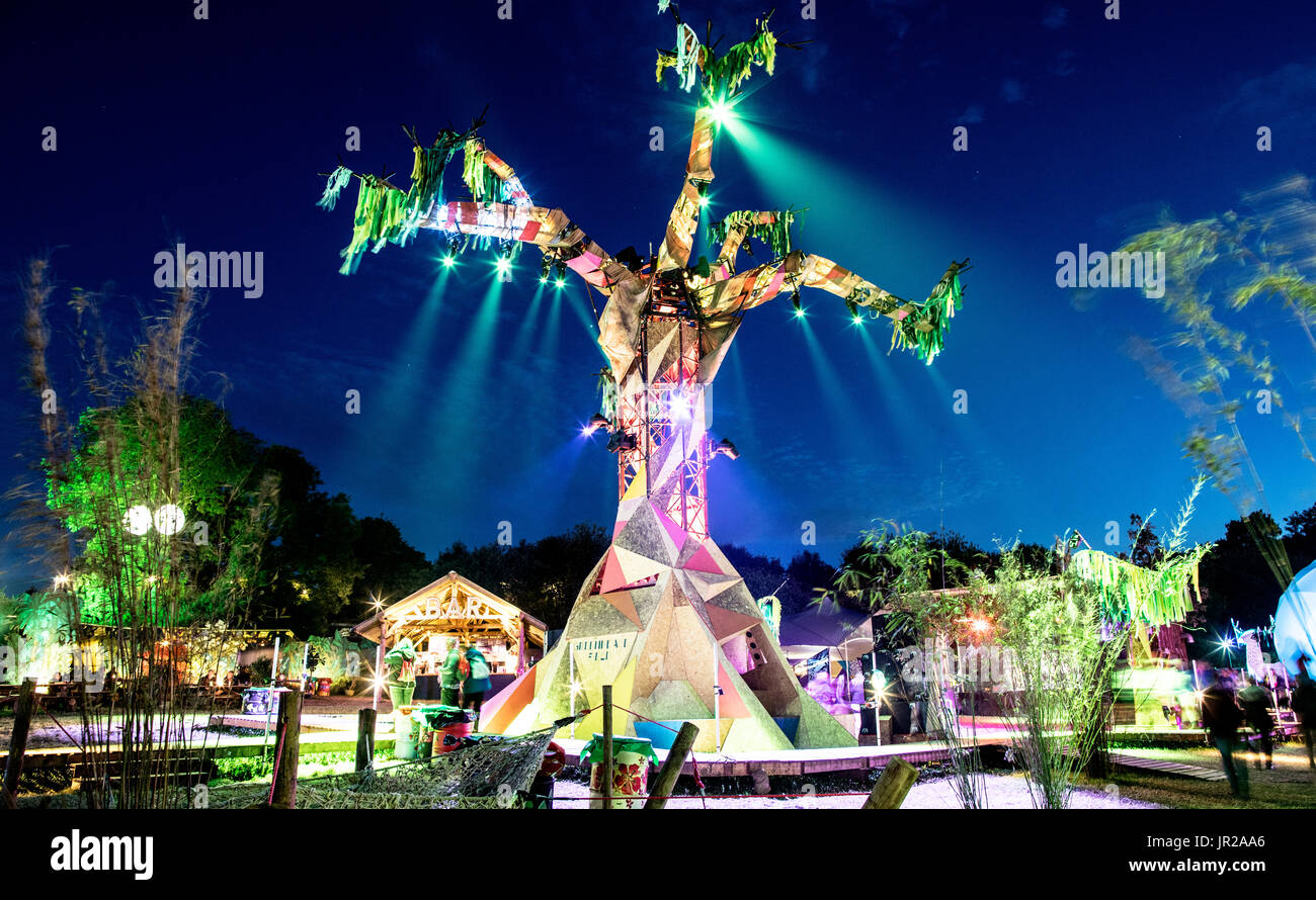The Giant Magic Tree at Night Glastonbury Festival UK Stock Photo - Alamy