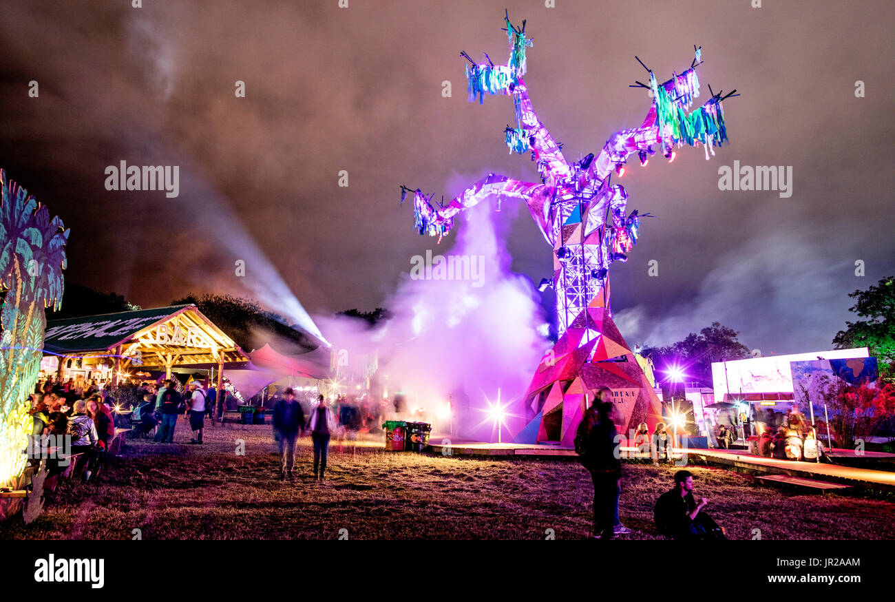 The Giant Magic Tree at Night Glastonbury Festival UK Stock Photo - Alamy