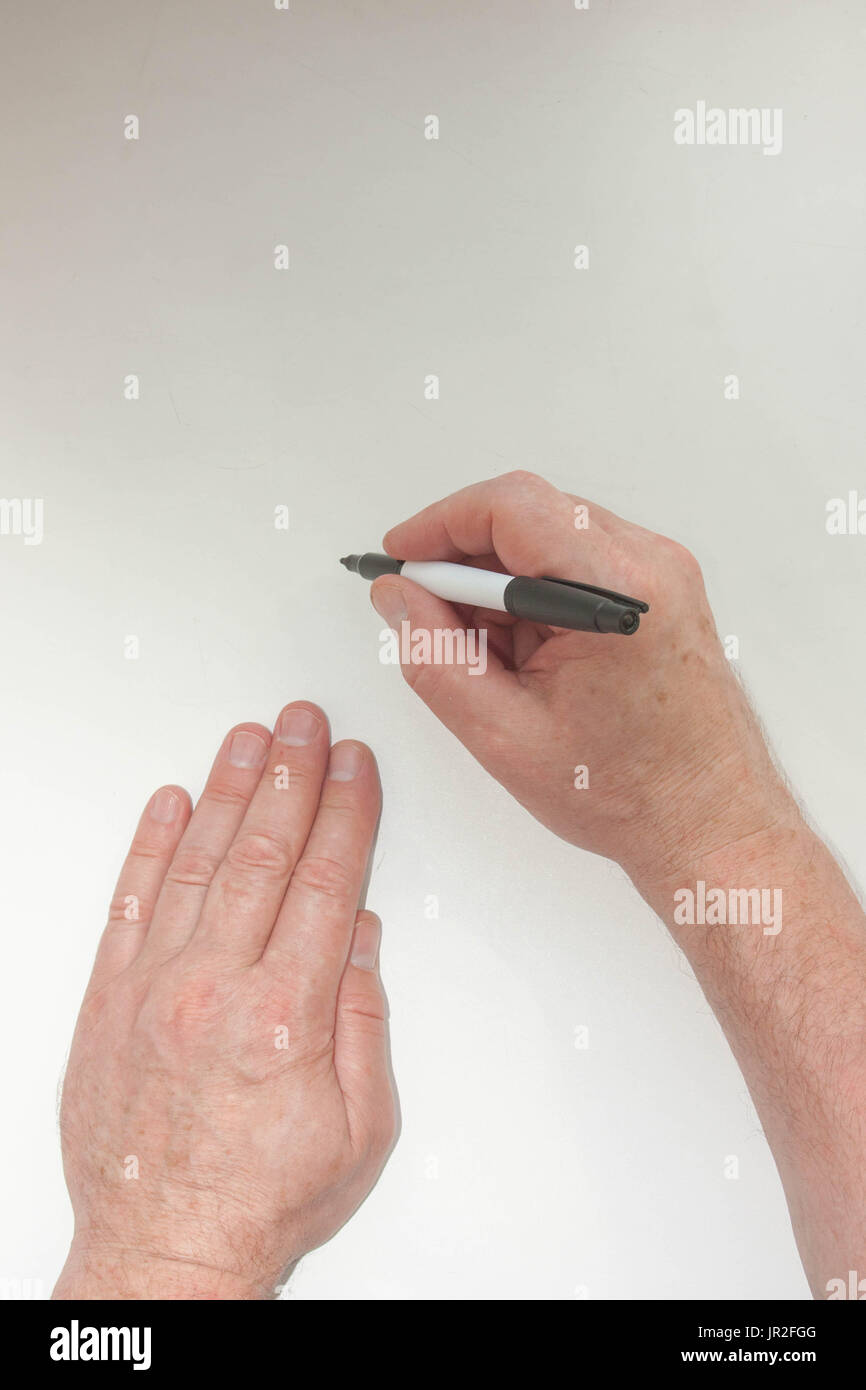 Hand and marker. Man's hand write marker on white with 2nd hand - palm ...