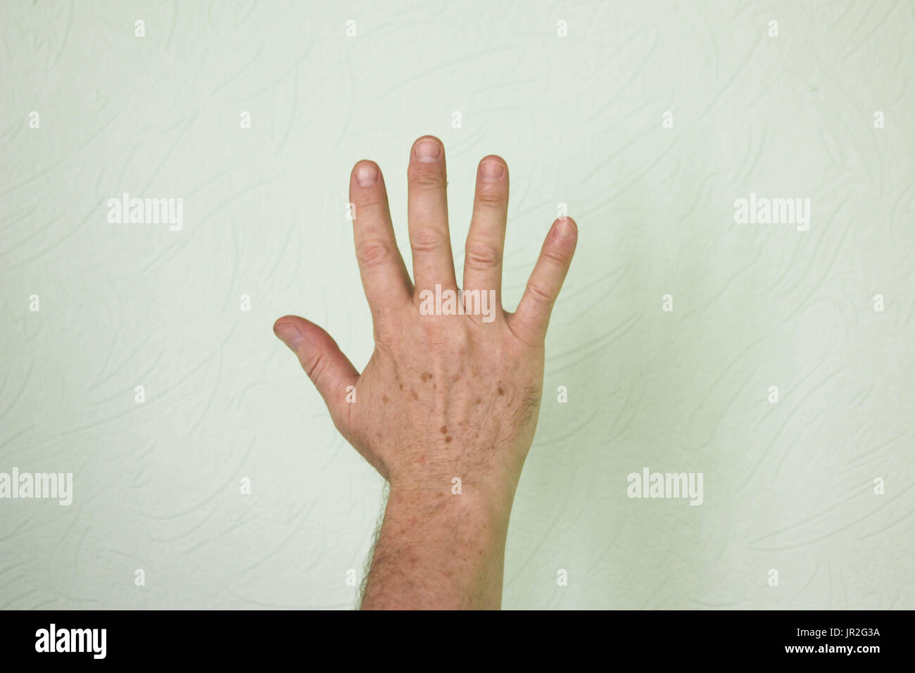 Hand male greeting sign. Photo Stock Photo - Alamy