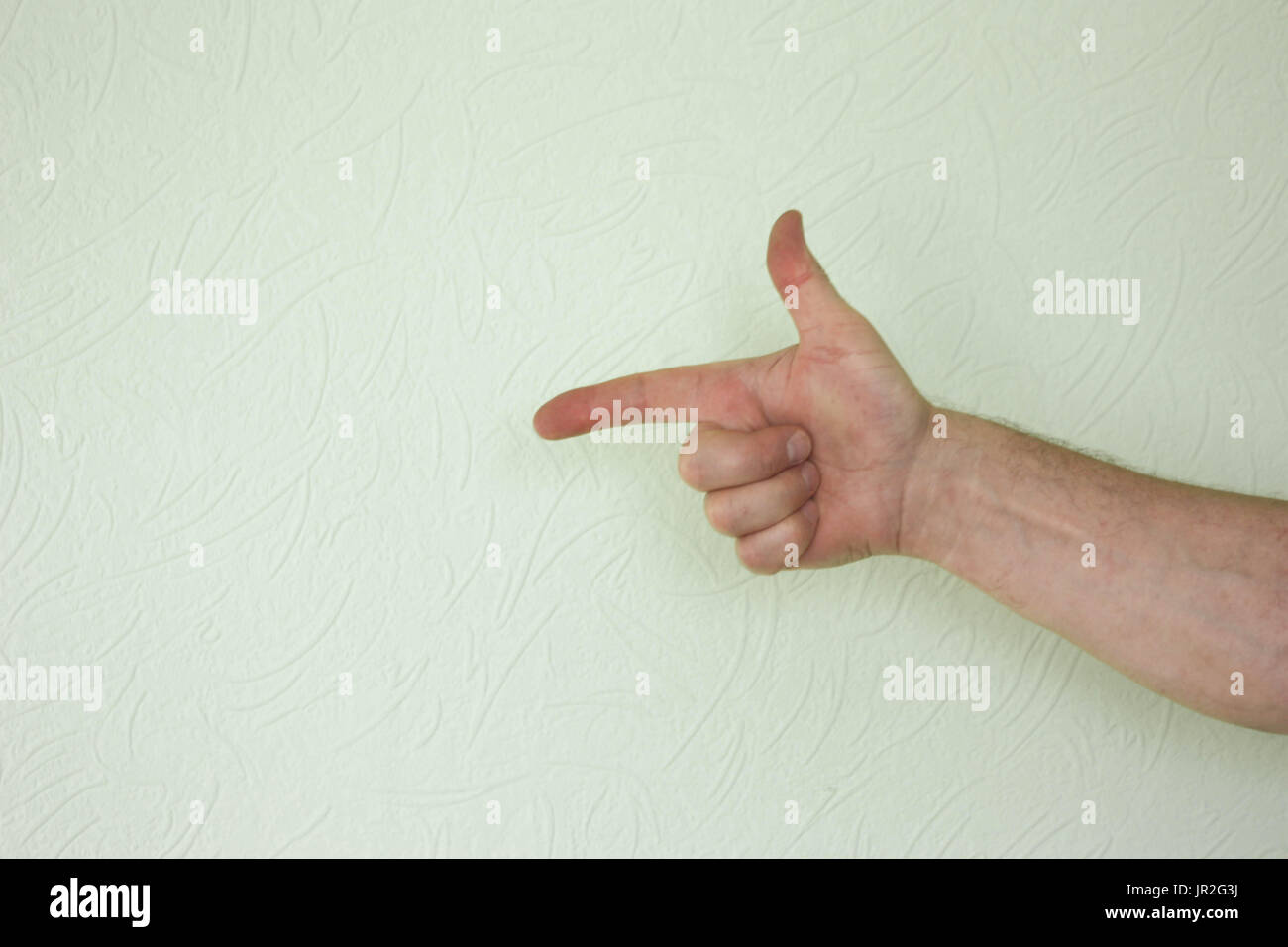 Hand male direction symbol Stock Photo - Alamy