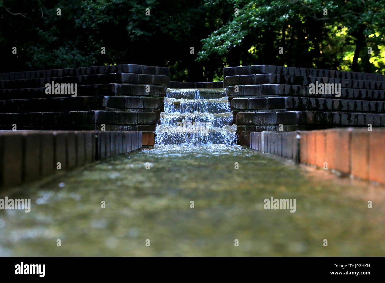 Water cascades down a water feature in Serigaya Park in Machida, Tokyo, Japan Stock Photo - Alamy