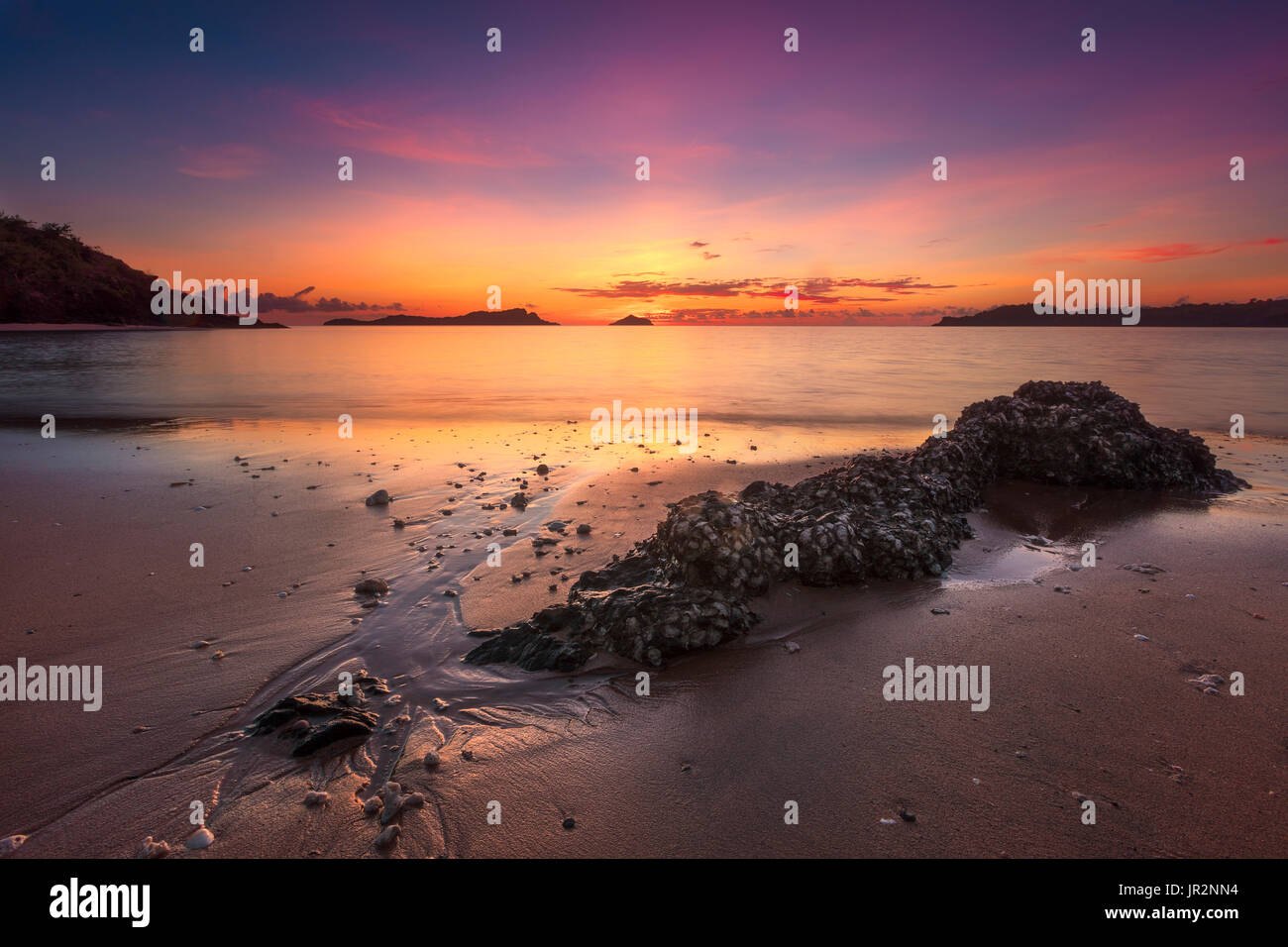 Beaches with igneous rock hi-res stock photography and images - Alamy
