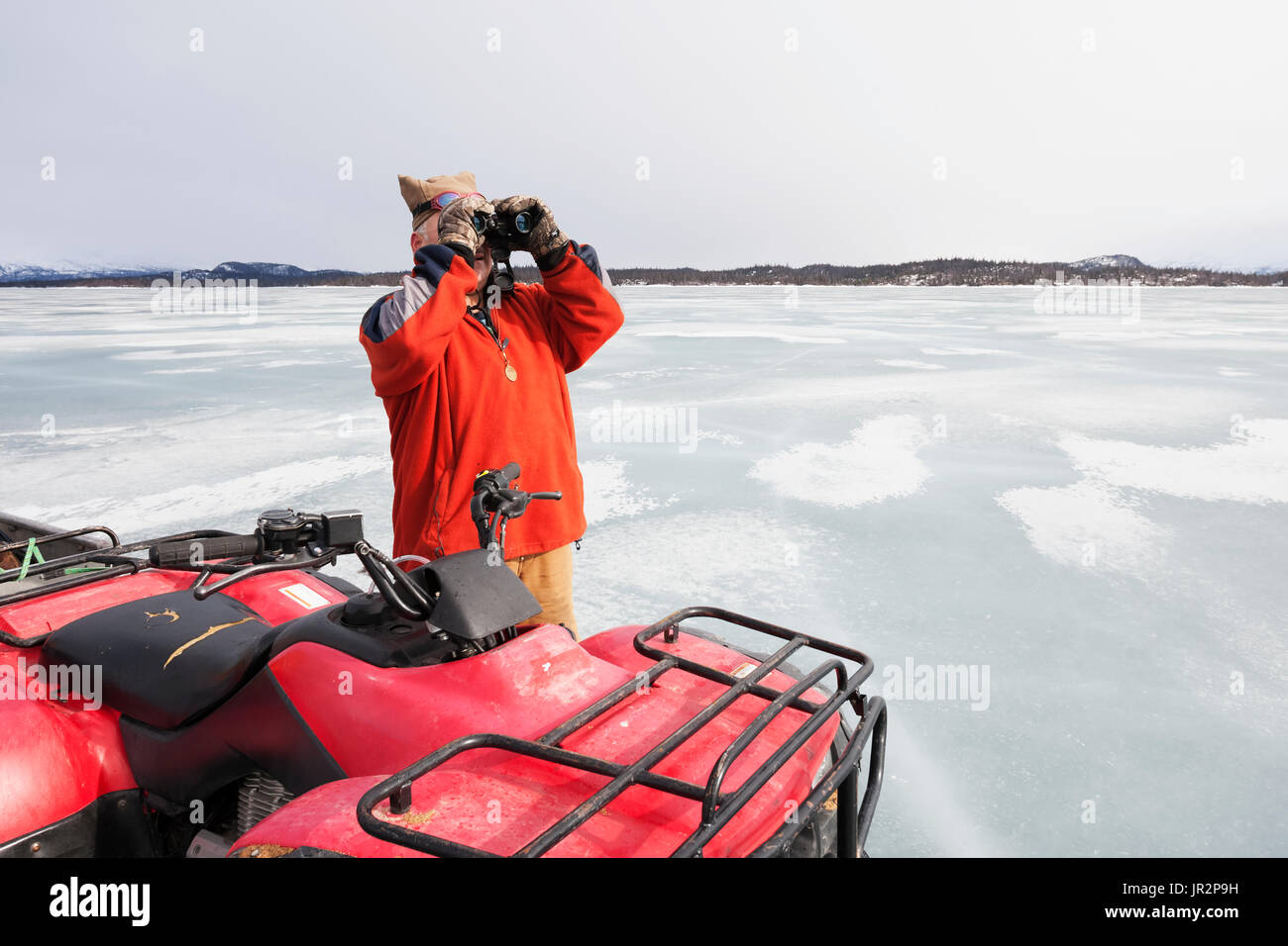 Hunter Glassing While On A Freshwater Harbor Seal Hunt, Lake Iliamna ...