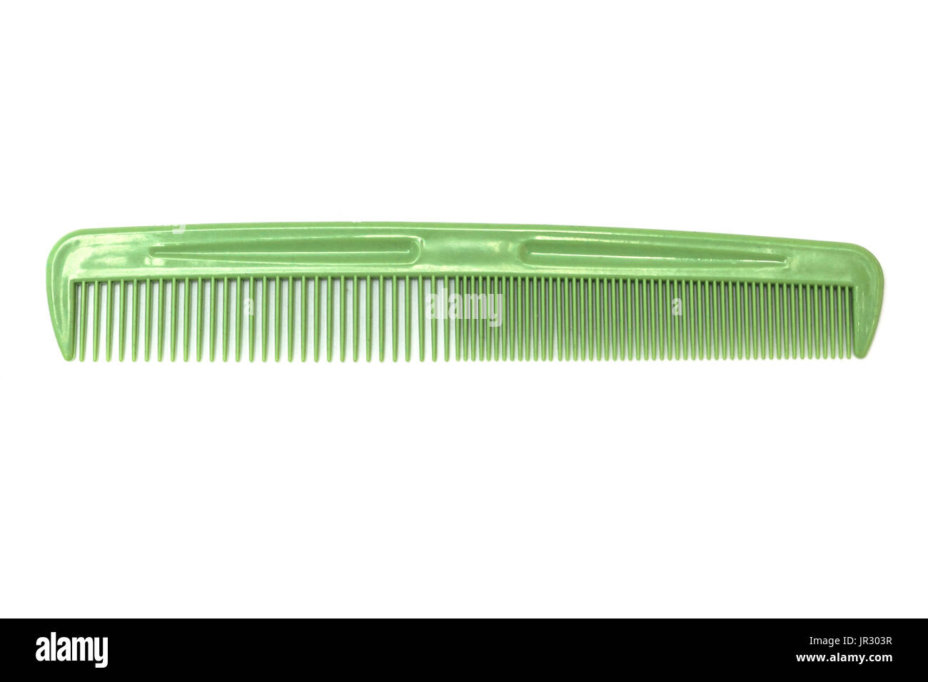 Green comb isolated on white background Stock Photo - Alamy