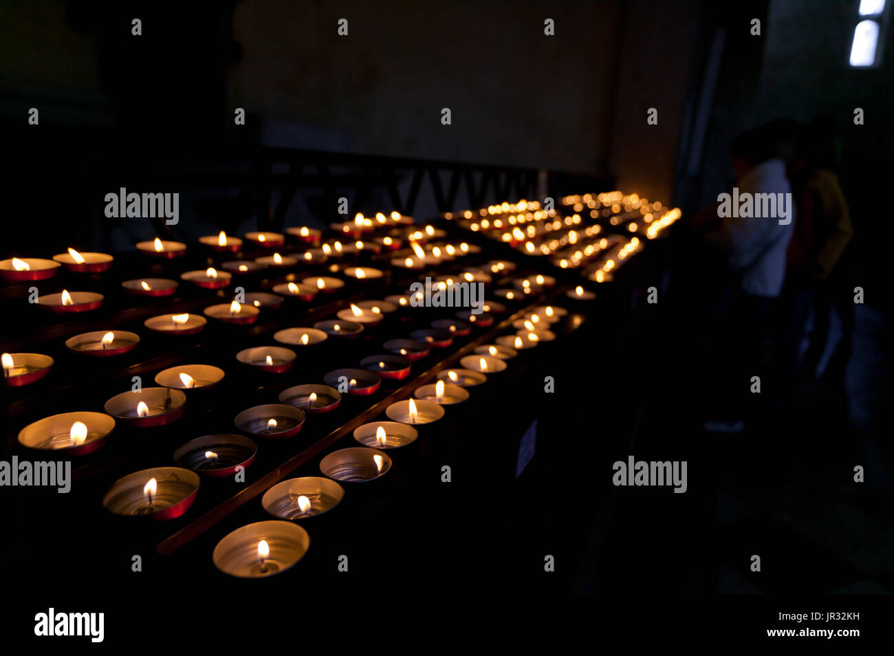 Candles light in the shadow Stock Photo - Alamy