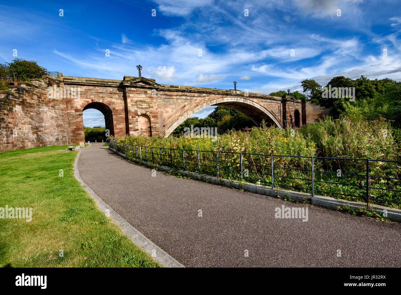 View of the Grosvenor Bridge in Chester from the North bank of the River Dee Stock Photo - Alamy