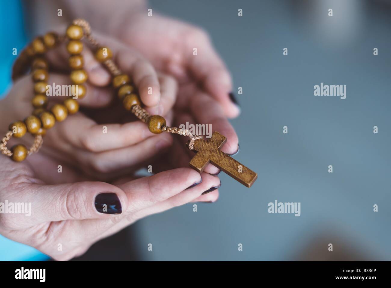 Kids Praying Hands With Rosary