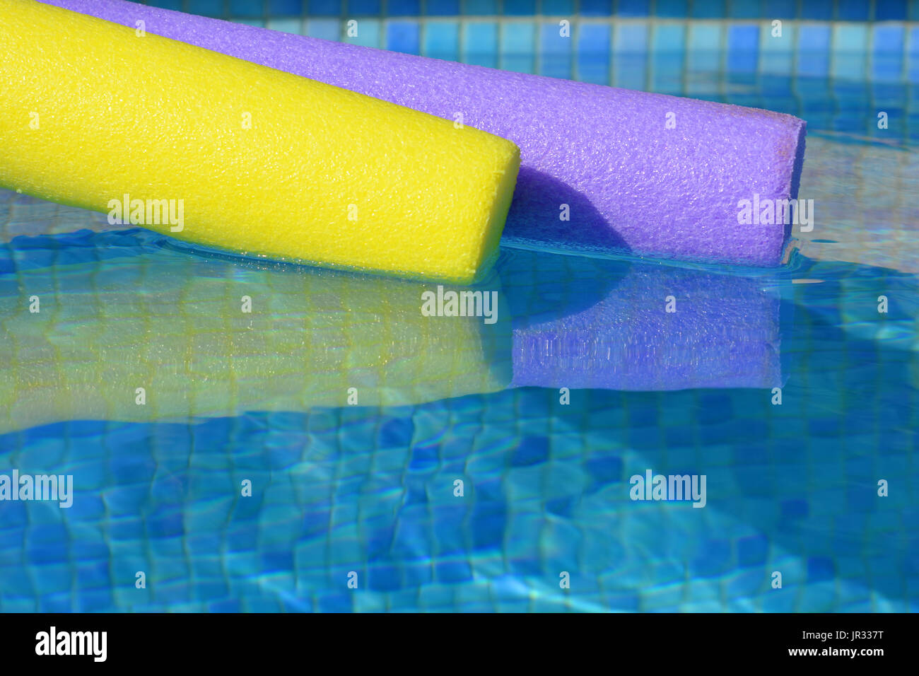 Pool noodles, made from polyethylene foam, in a swimming pool Stock ...