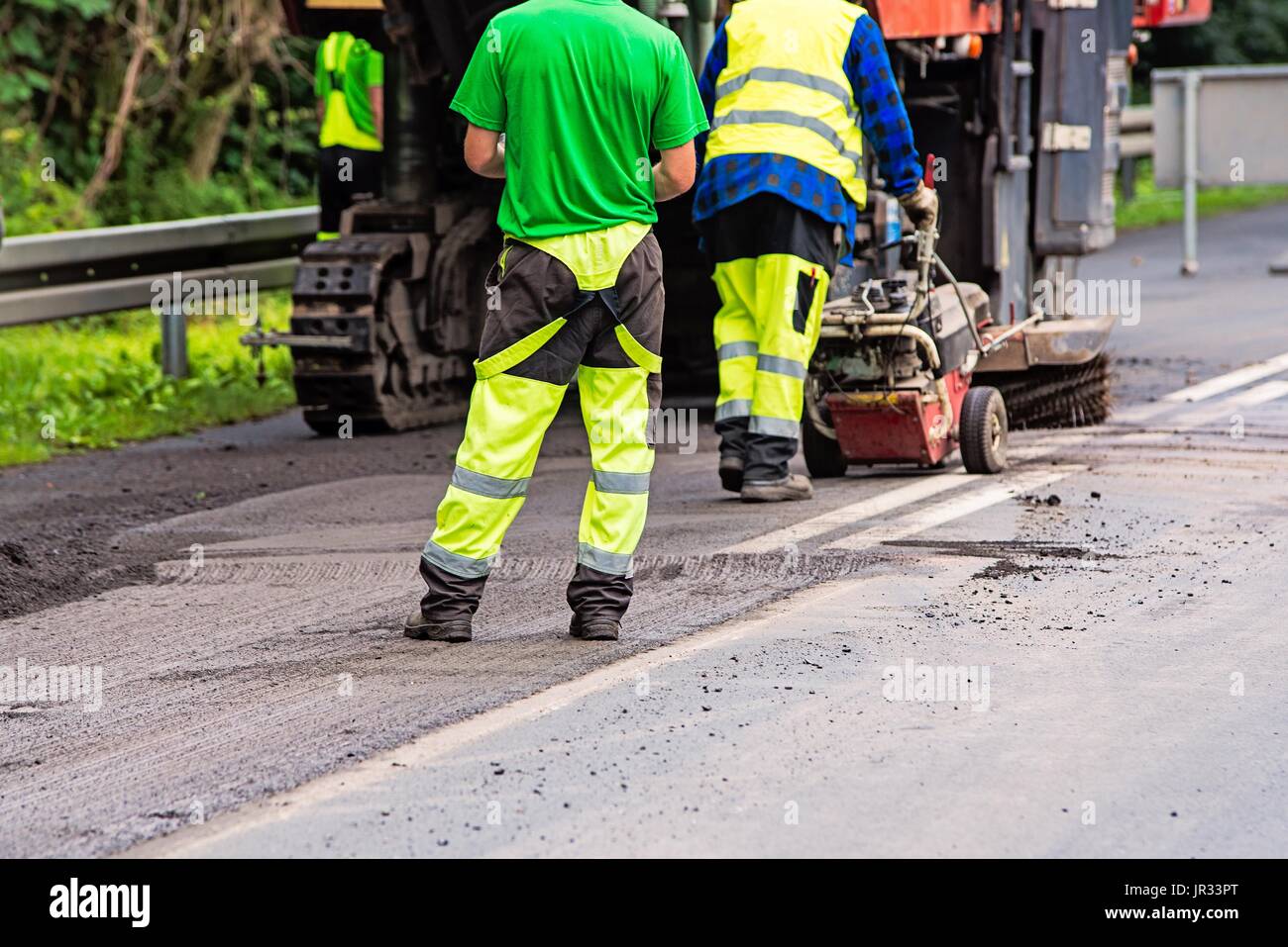 Summer road work. Road renewal. Traffic Jam Stock Photo - Alamy