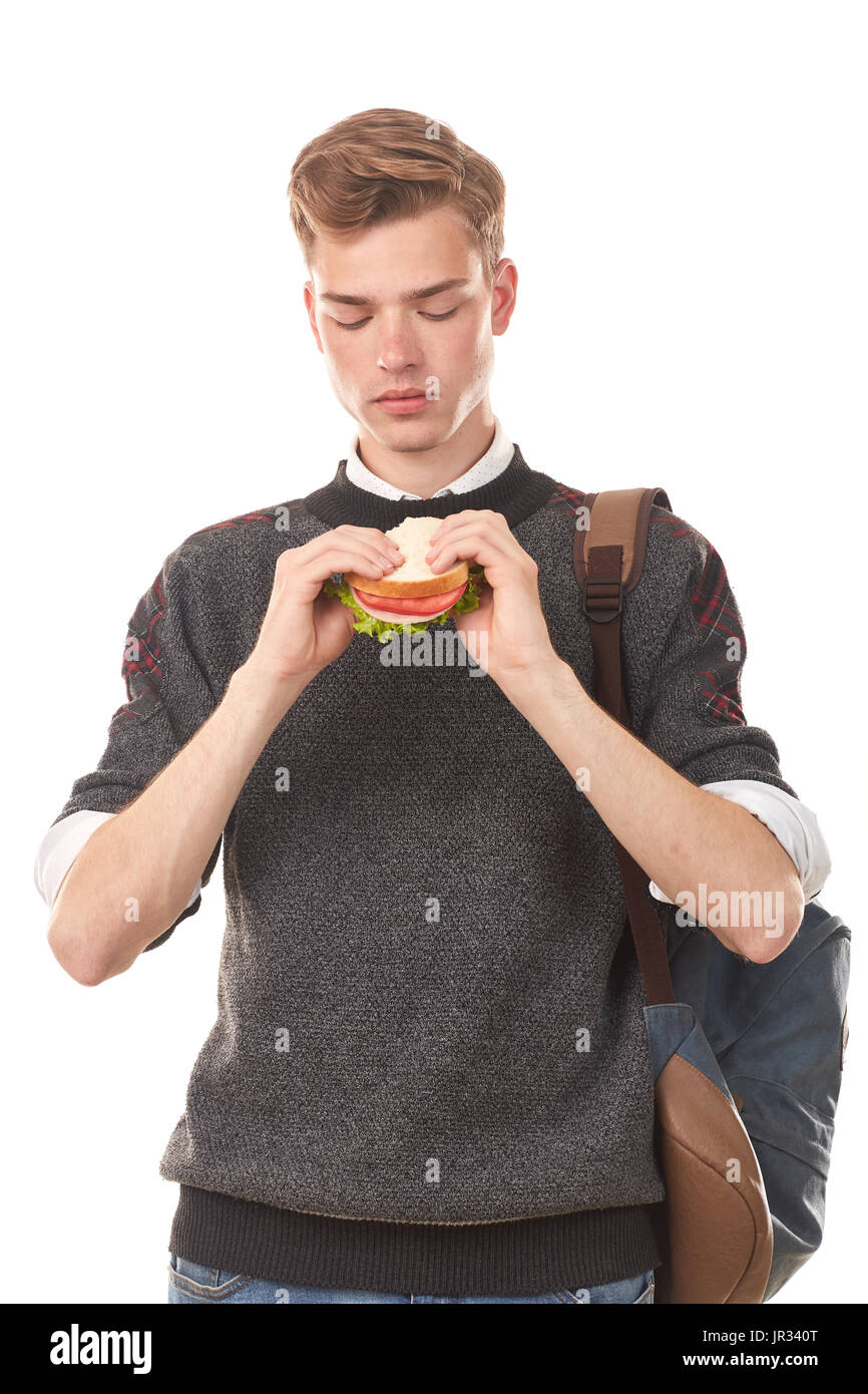 Student eating sandwich Stock Photo - Alamy