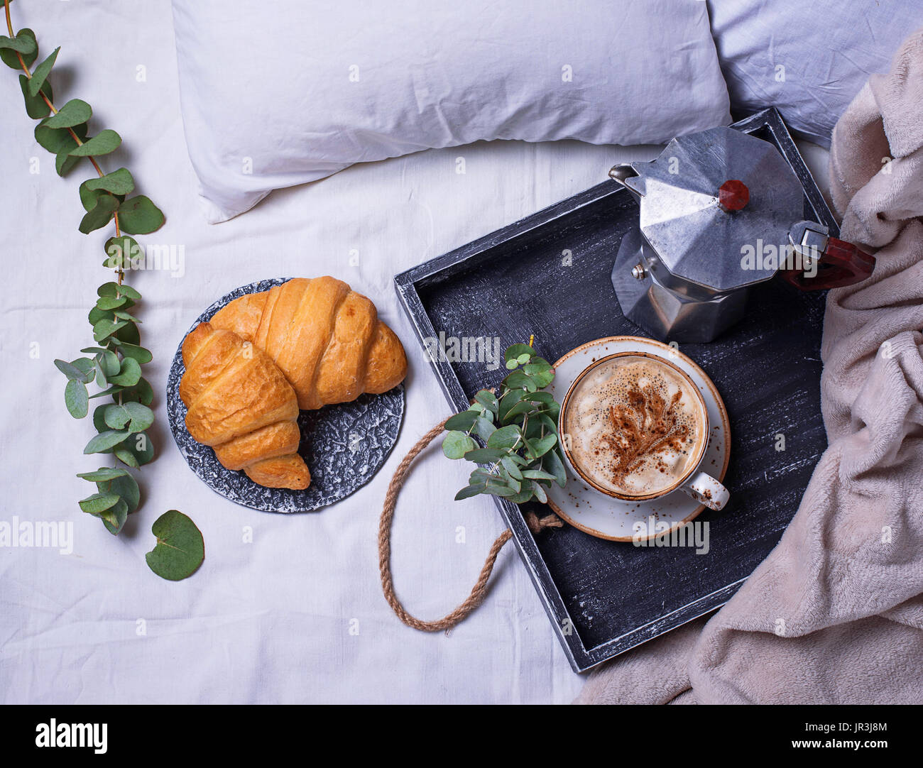 Breakfast in bad. Croissants and cup of coffee Stock Photo - Alamy
