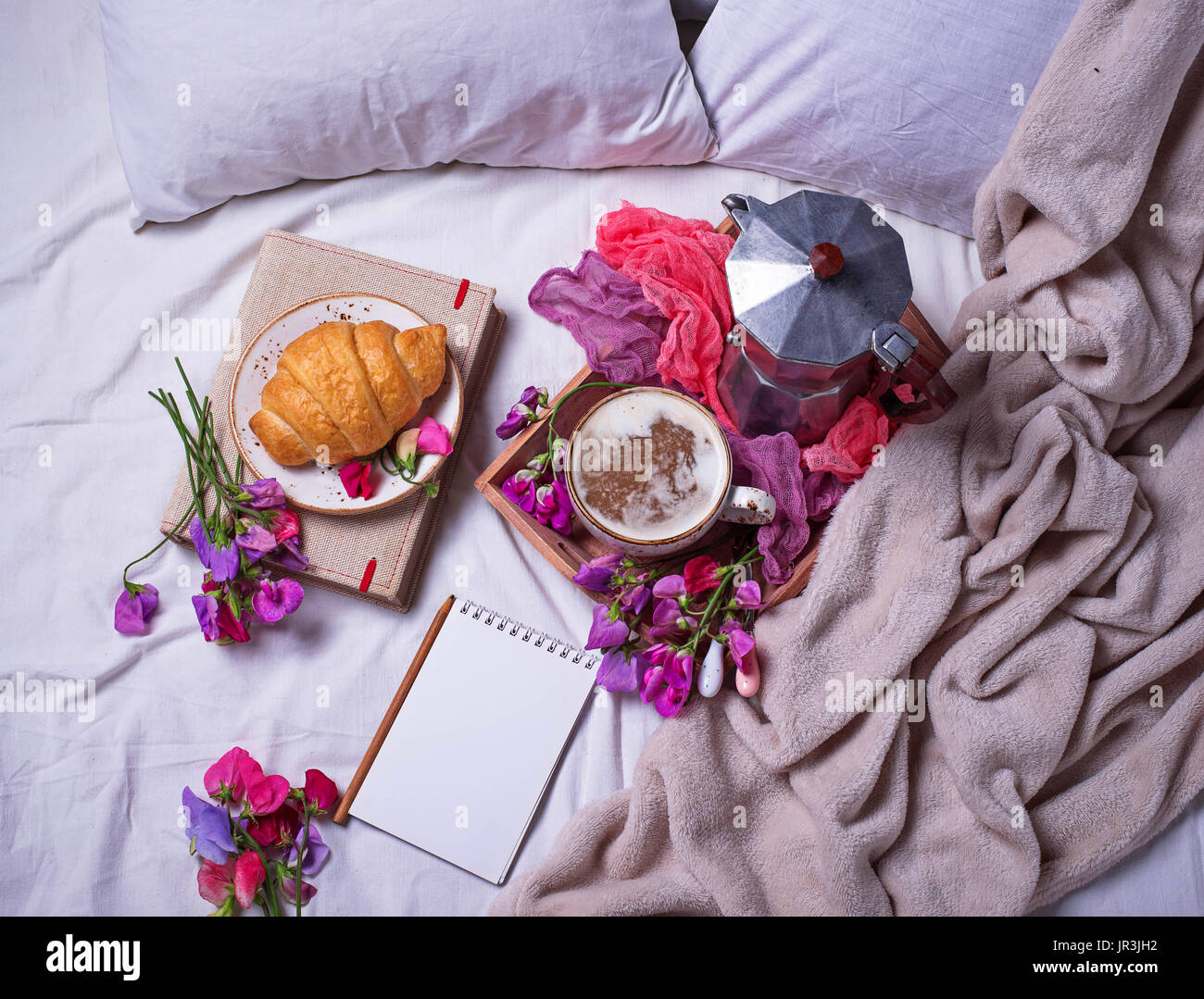Breakfast in bad. Croissants and cup of coffee Stock Photo - Alamy