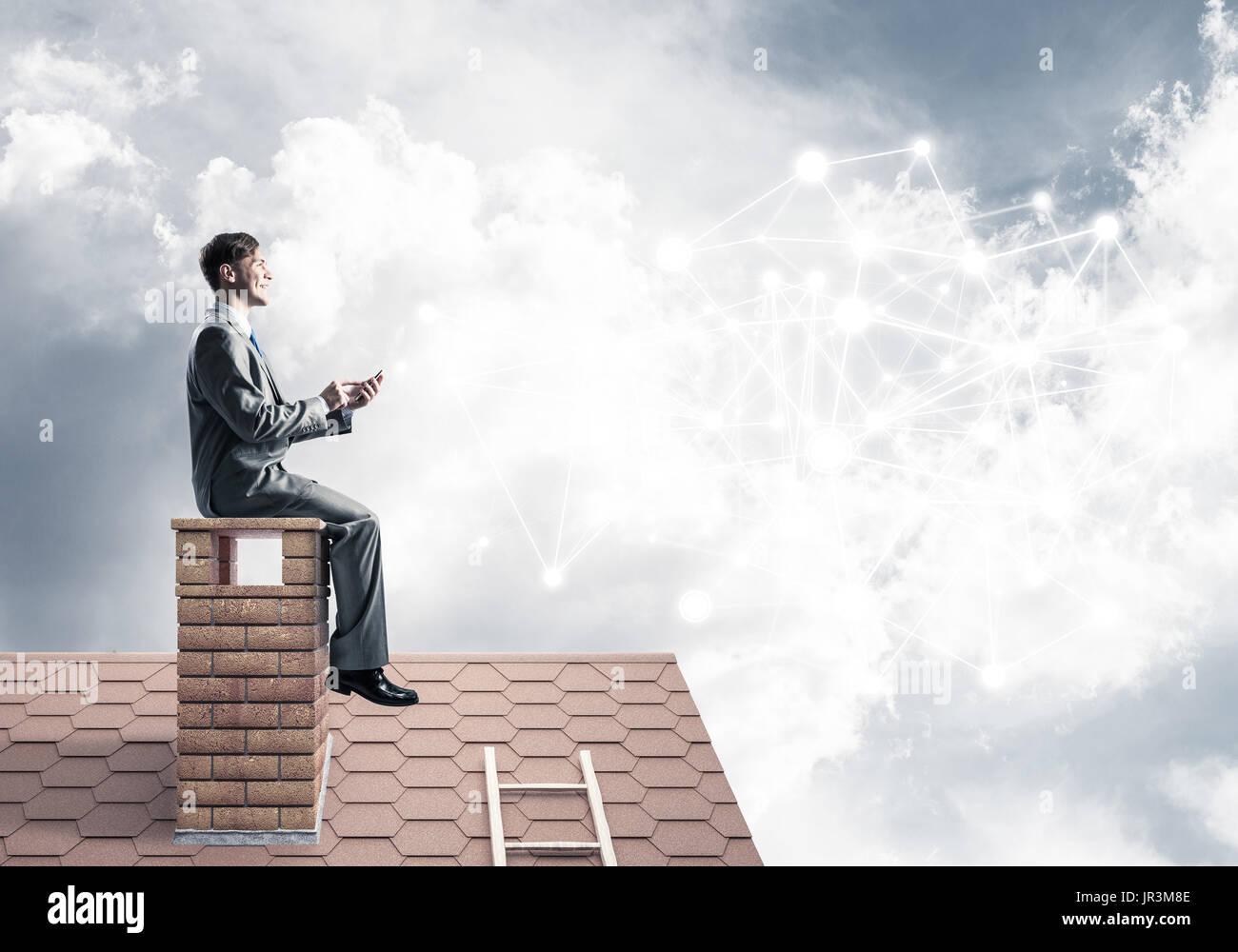 Man on roof with smartphone and concept of social connection Stock ...