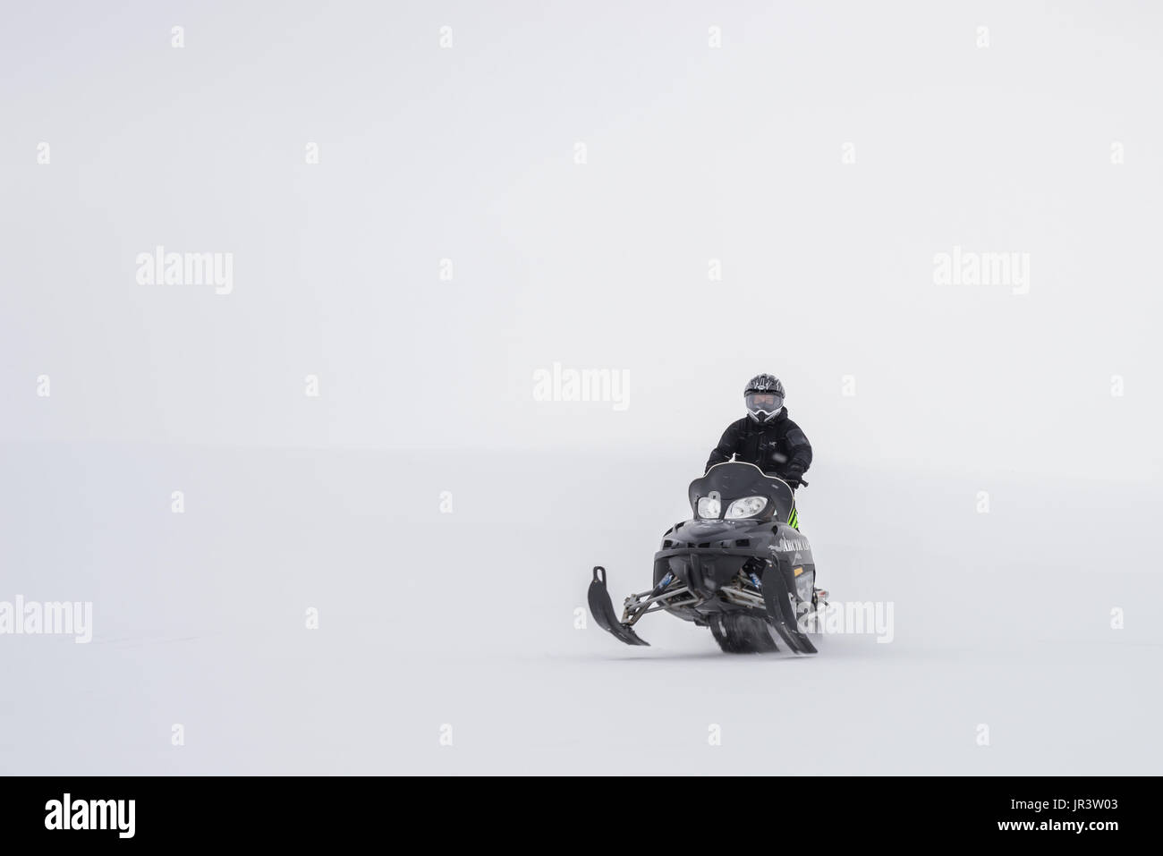 Driving winter snowmobile hi-res stock photography and images - Alamy