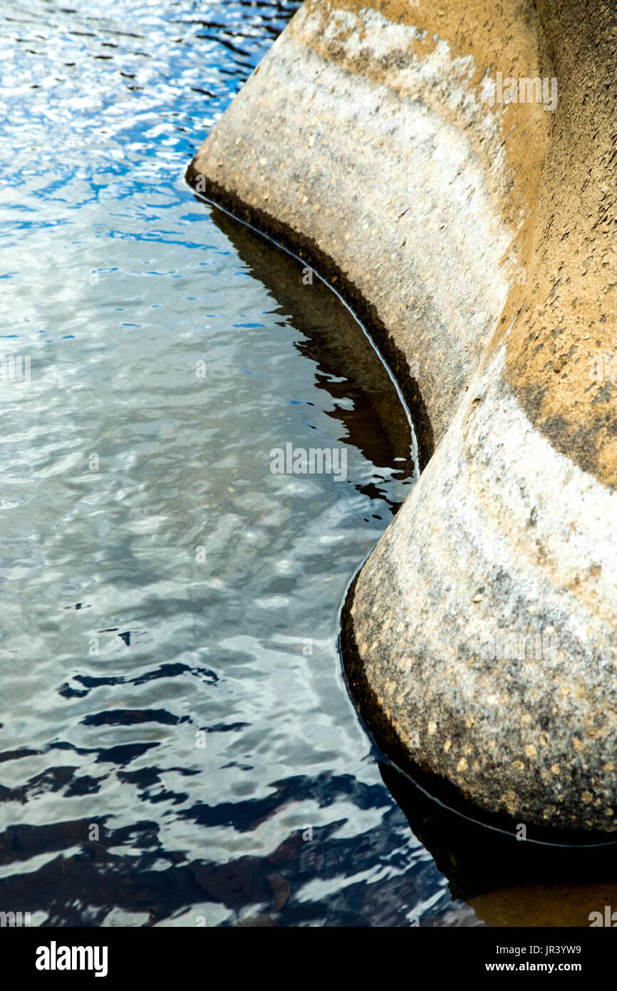 Reflective river rock Stock Photo - Alamy