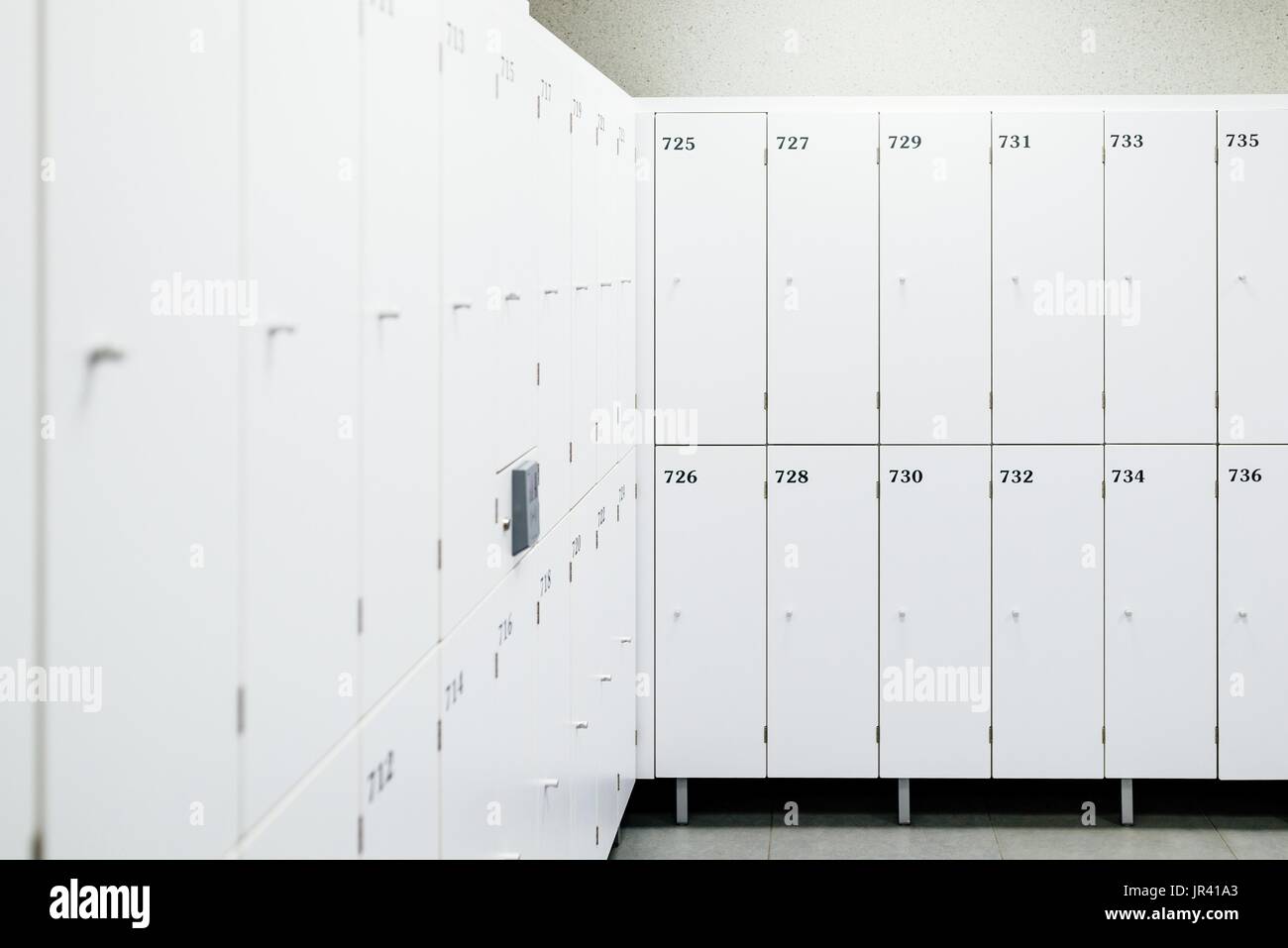 White change room lockers with electronic access control Stock Photo ...