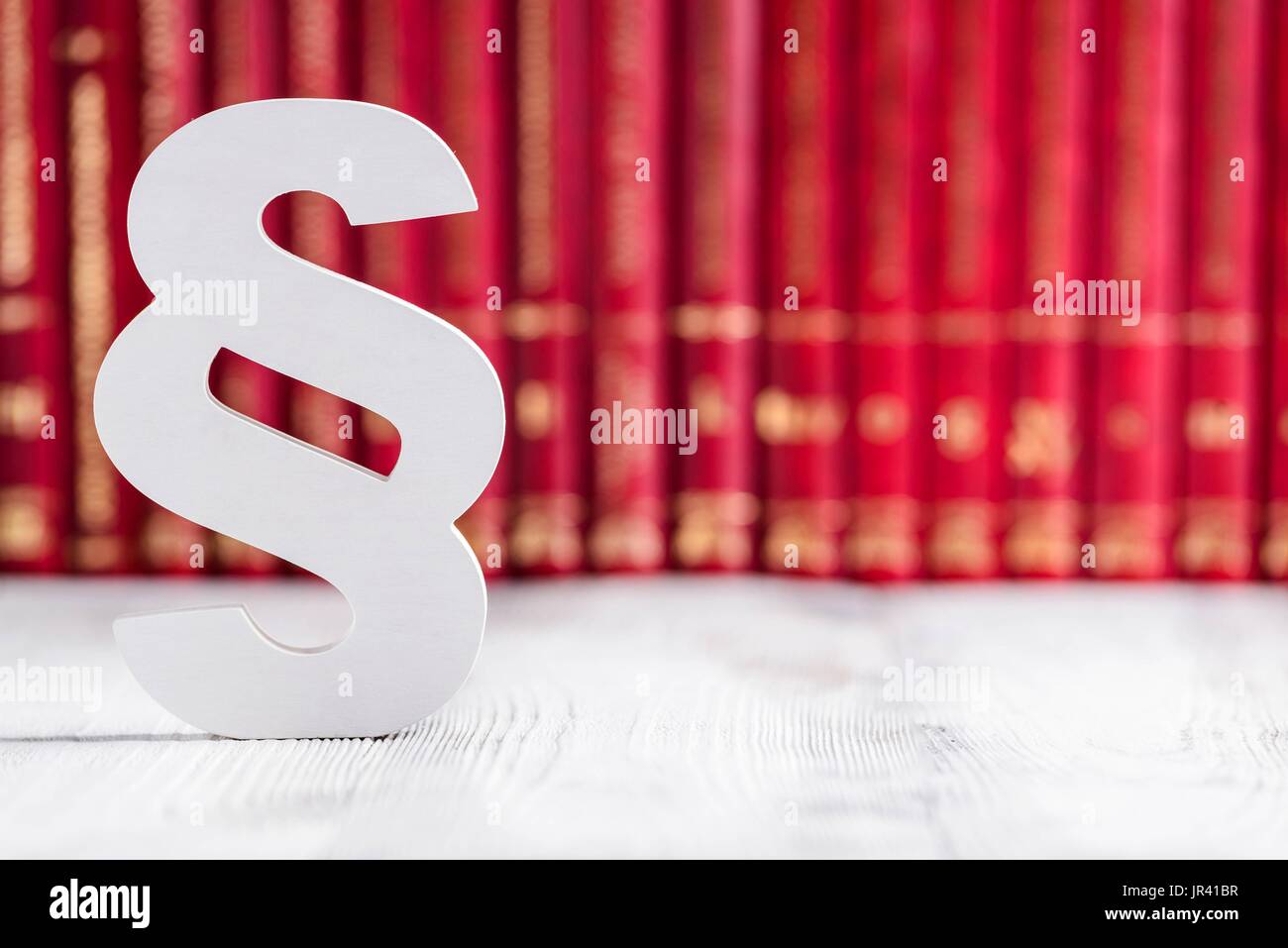 White wooden paragraph the symbol of law Stock Photo - Alamy