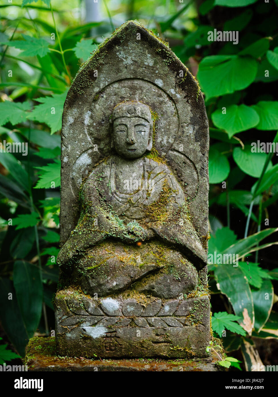 Stone Statue in Forest Stock Photo - Alamy