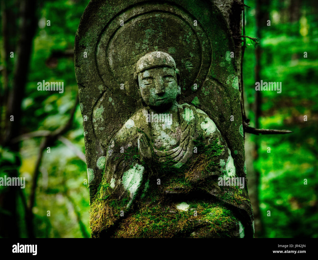 Stone Statue in Forest Stock Photo - Alamy