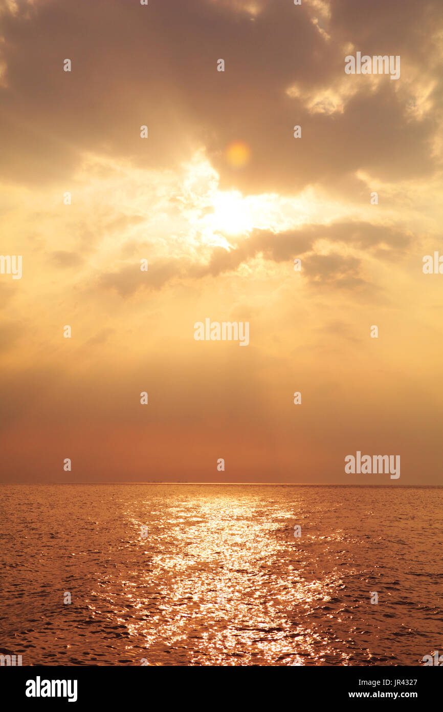 Afternoon sunset by the sea Stock Photo - Alamy