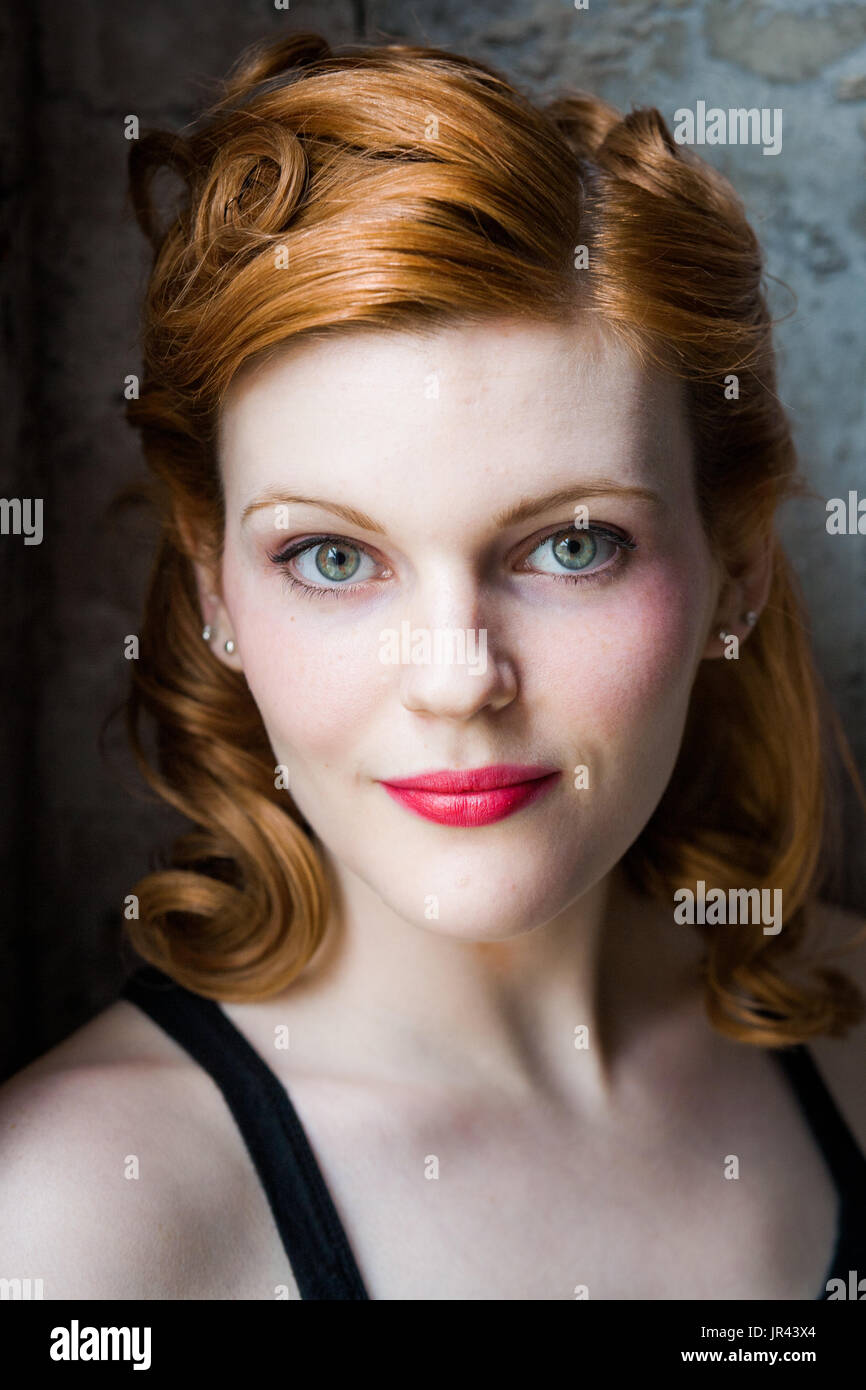 Young woman (20s) with 1940s style hair Stock Photo - Alamy