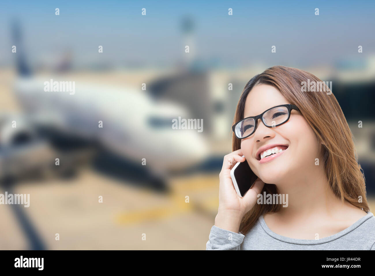 happy flight concept with smiling customer Stock Photo - Alamy