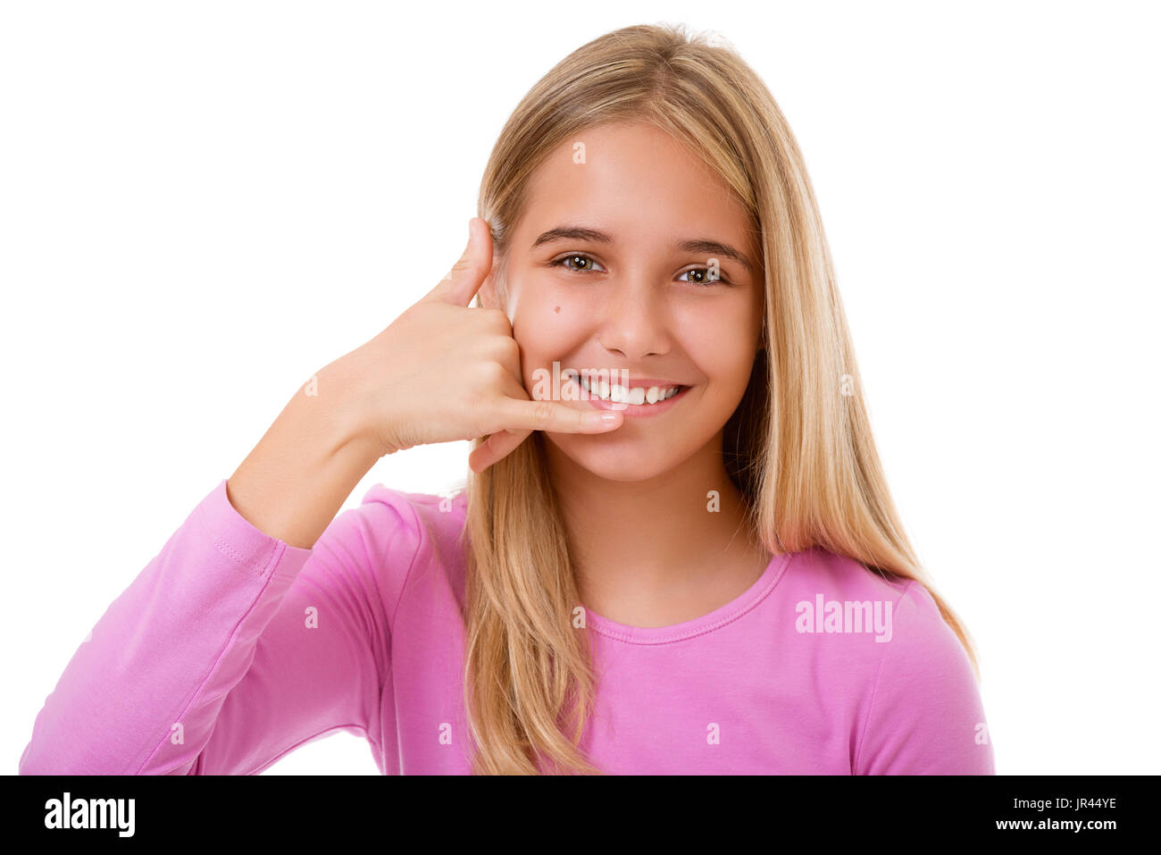 Portrait of lovely young girl taking a call me gesture over white ...