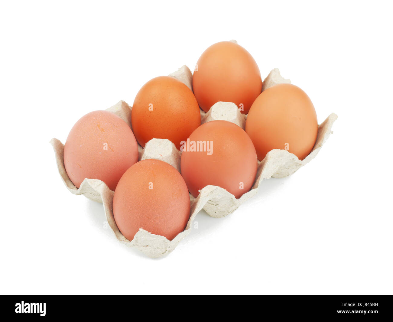 Organic eggs in paperboard egg cartons isolated on white Stock Photo ...