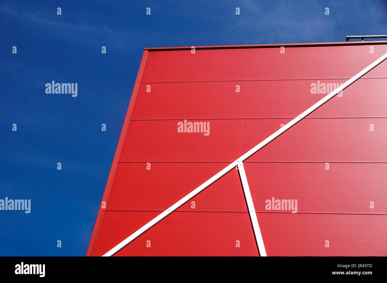 details of aluminum facade with colorful red panels Stock Photo - Alamy