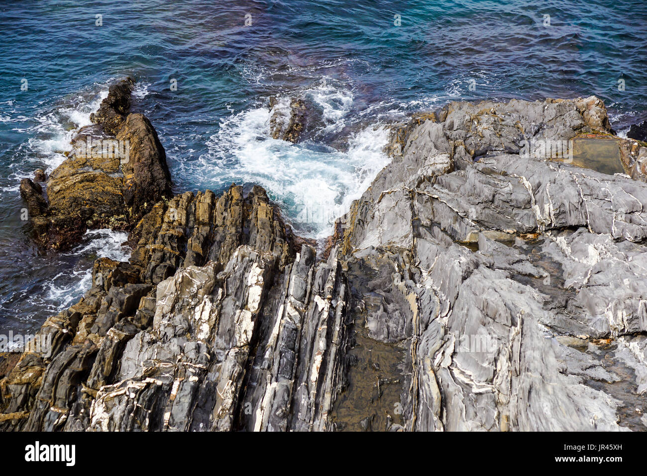 Sea landscape. Evening on the stone beach Stock Photo - Alamy