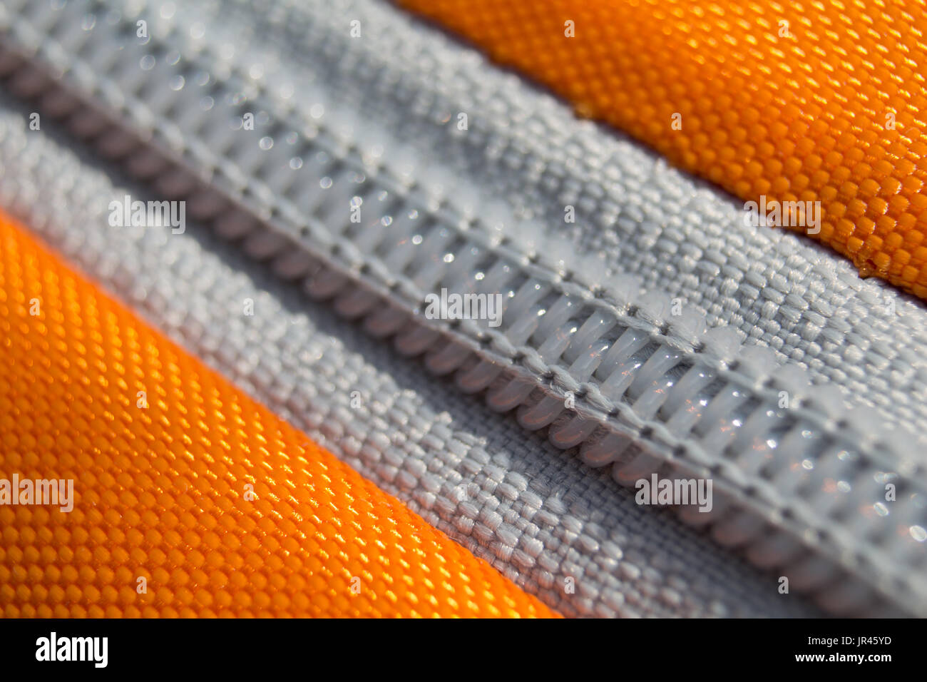 Grey zip hi-res stock photography and images - Alamy