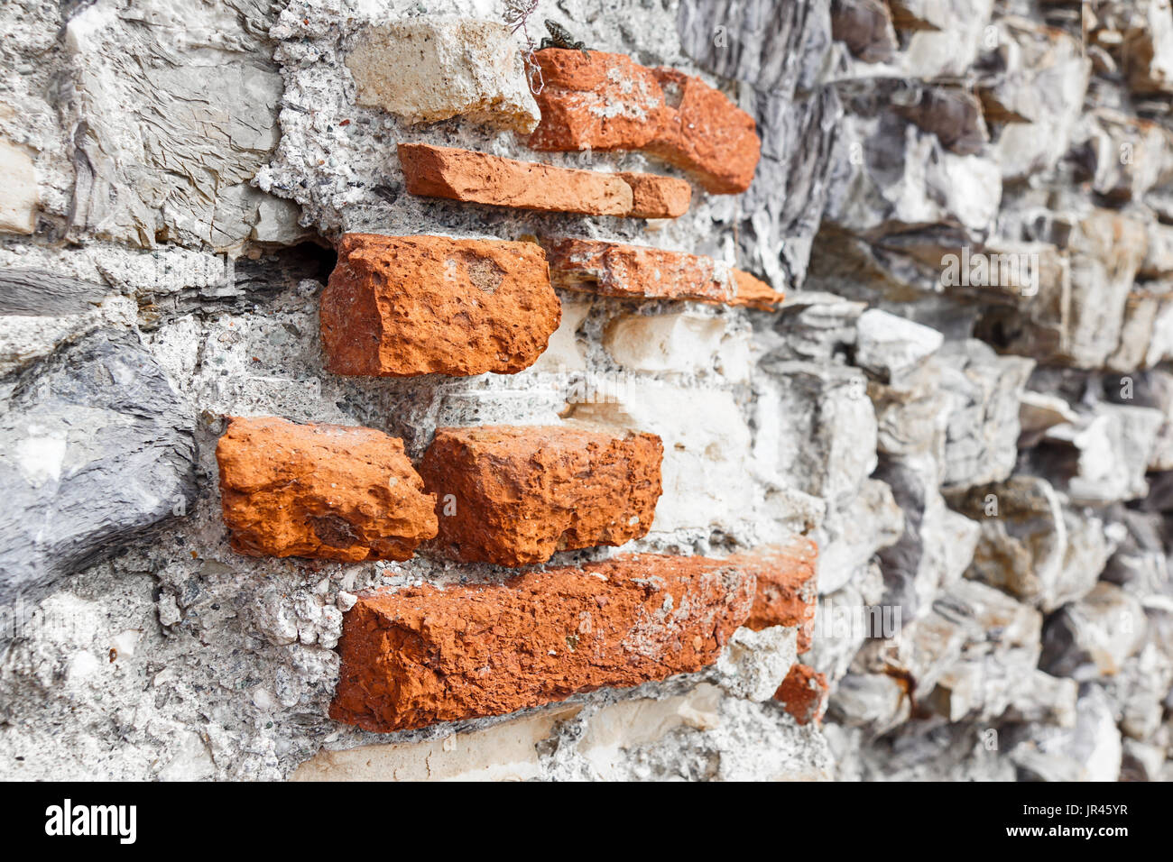 Closeup of Stack of Raw Bricks on the external wall Stock Photo - Alamy
