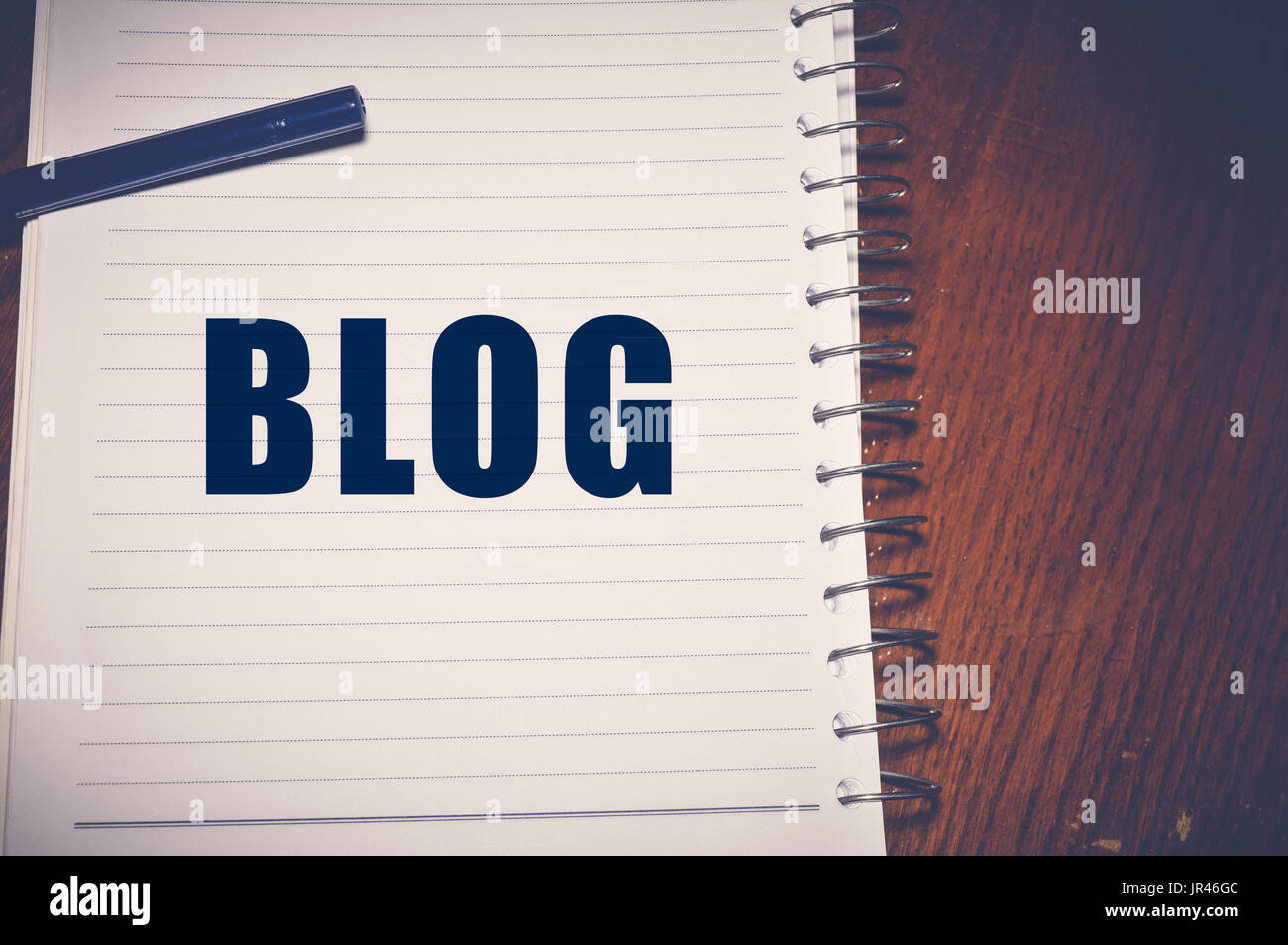 Blog written on white paper, technology concept Stock Photo - Alamy