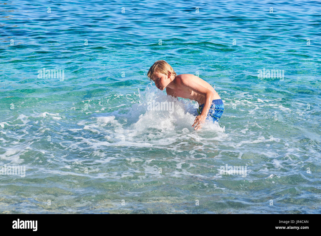 Child boy splash splashing water hi-res stock photography and images ...