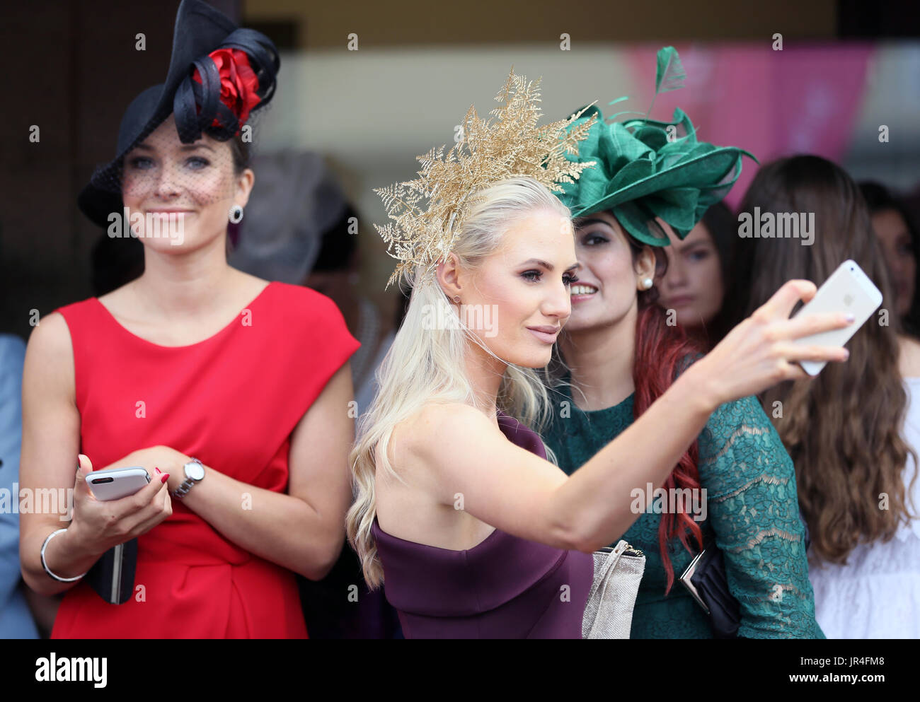 Female racegoers during Ladies Day of the Galway Summer Festival at ...