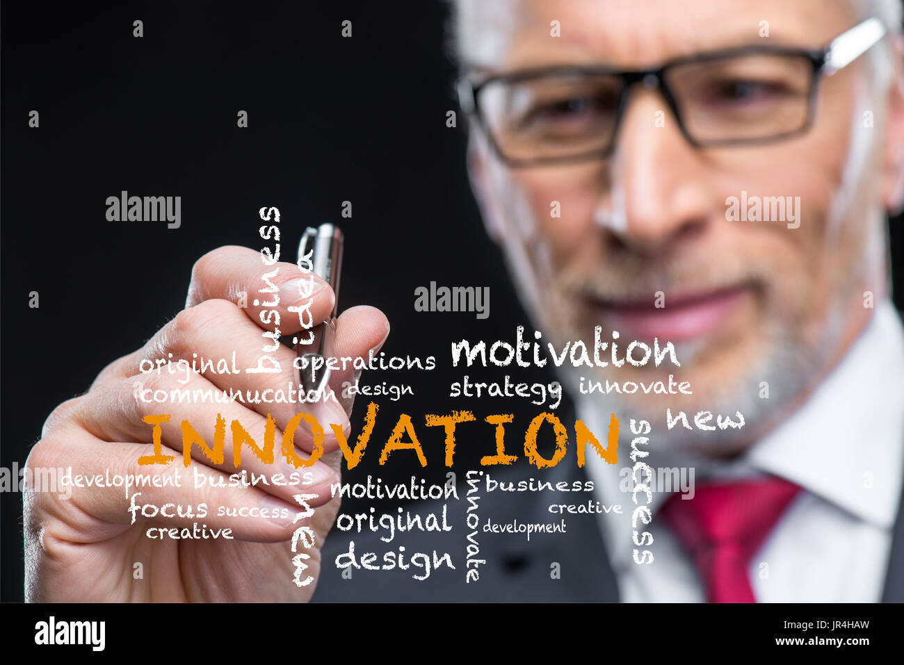 Businessman writing on virtual screen Stock Photo - Alamy